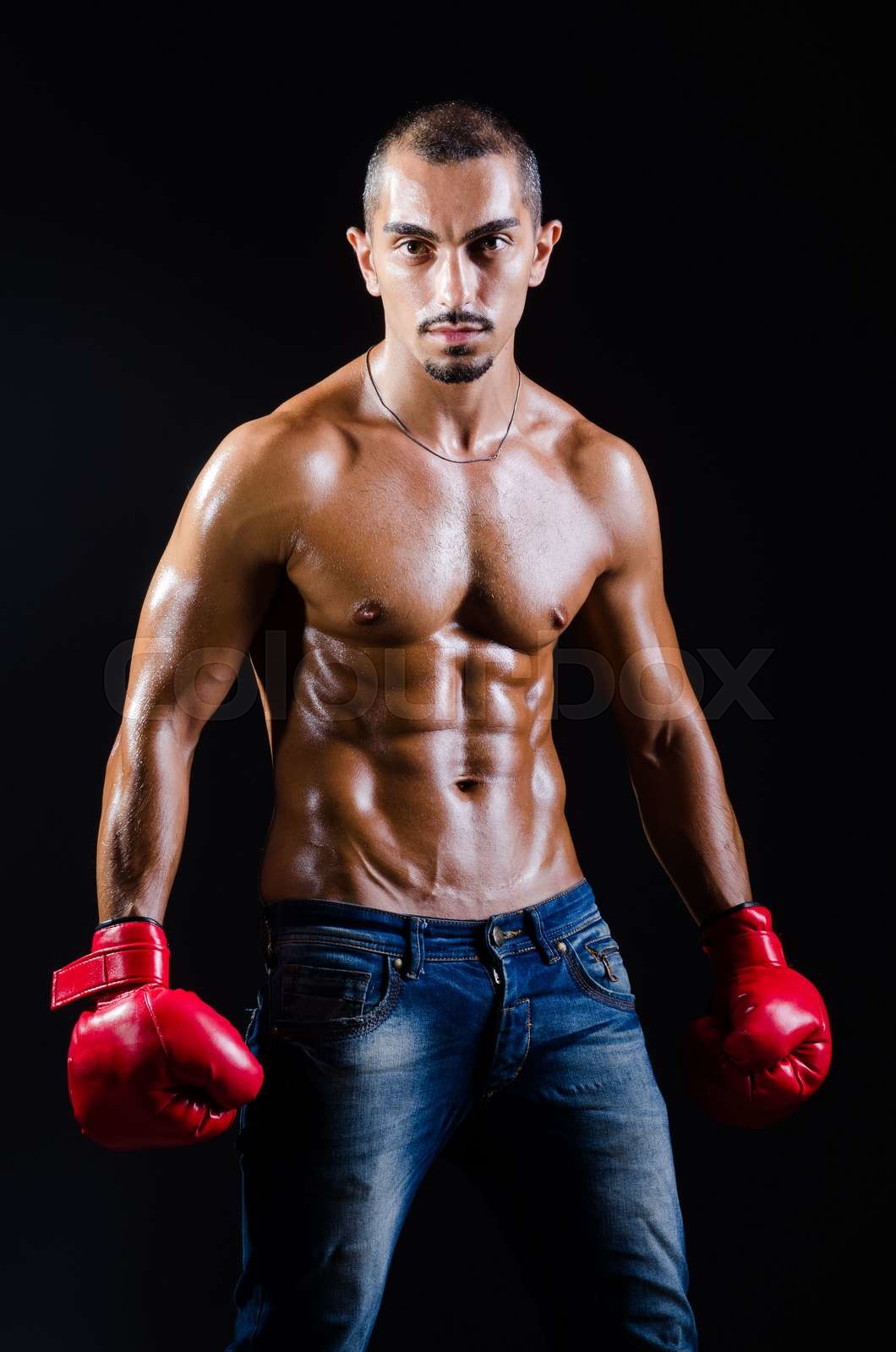 Ripped boxer in sports concept | Stock image | Colourbox