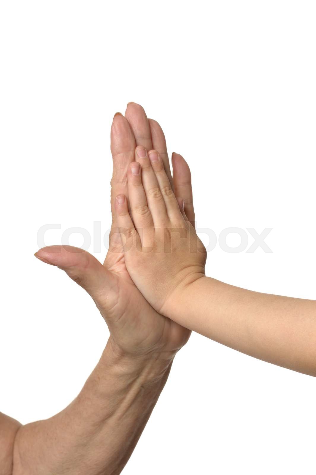 Two hands giving each | Stock image | Colourbox