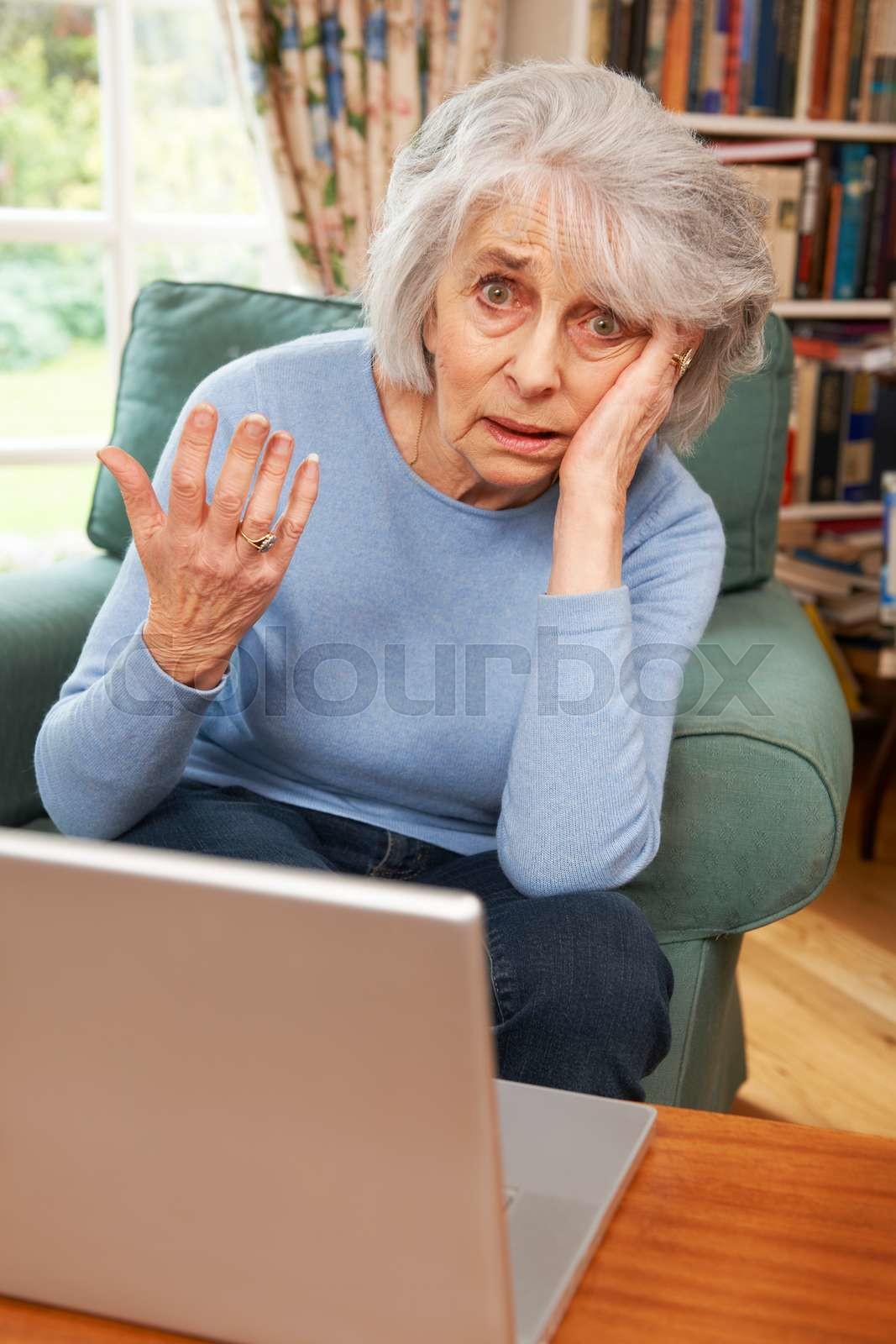 Frustrated Senior Woman Tring To Use Laptop Computer | Stock image ...