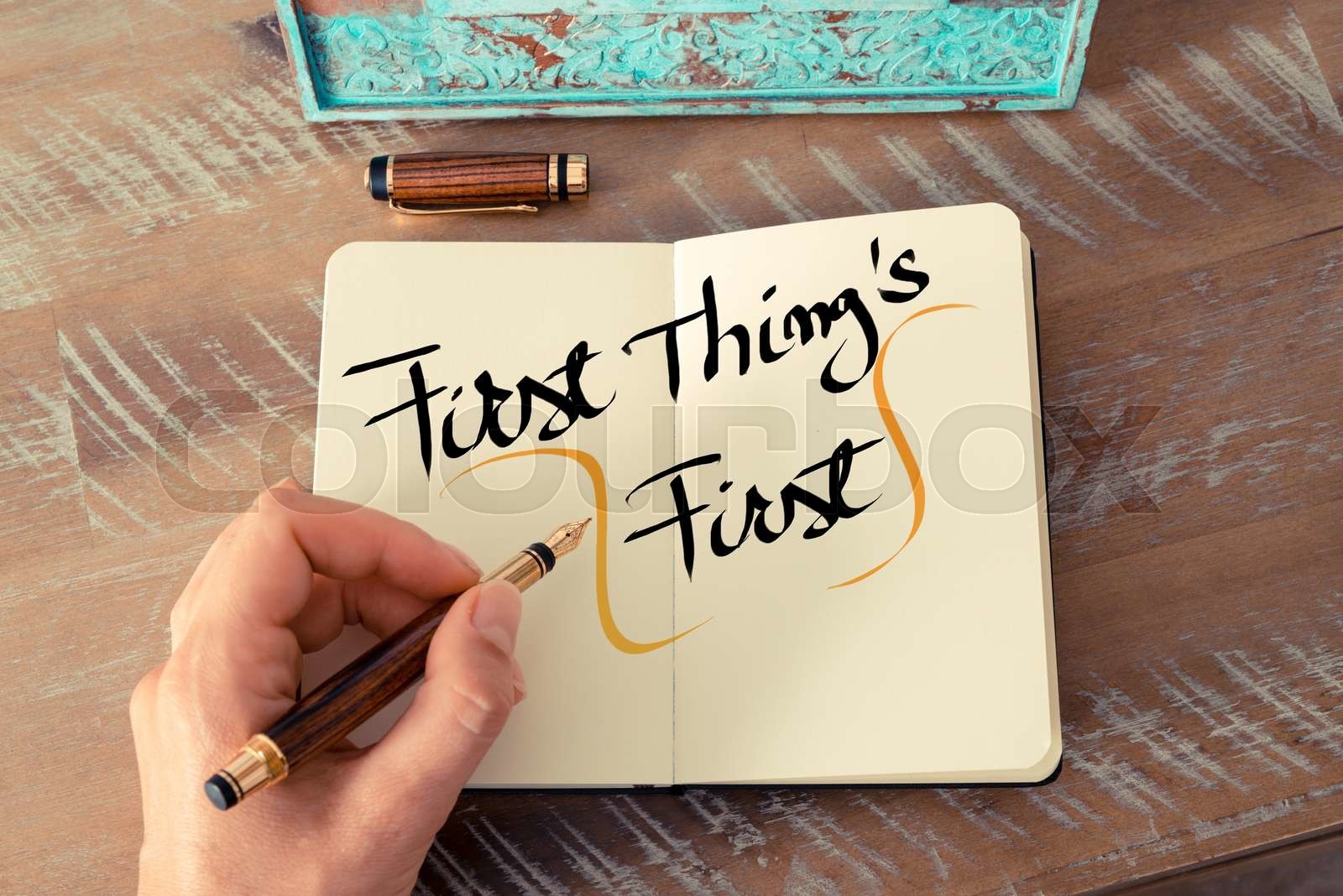 Written text First Thing's First | Stock image | Colourbox