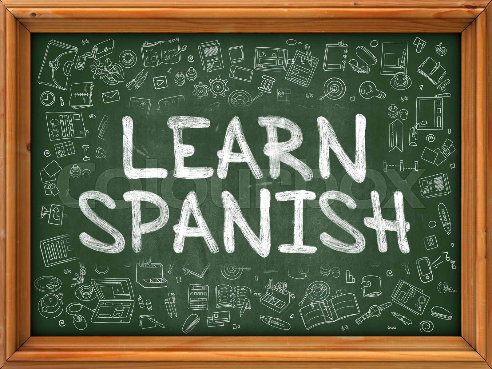 Learn Spanish - Hand Drawn on Green Chalkboard. | Stock image | Colourbox