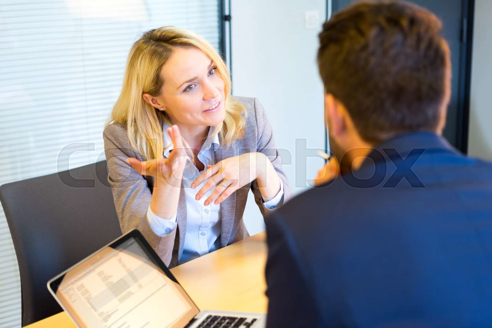 Young attractive woman during job interview | Stock image | Colourbox