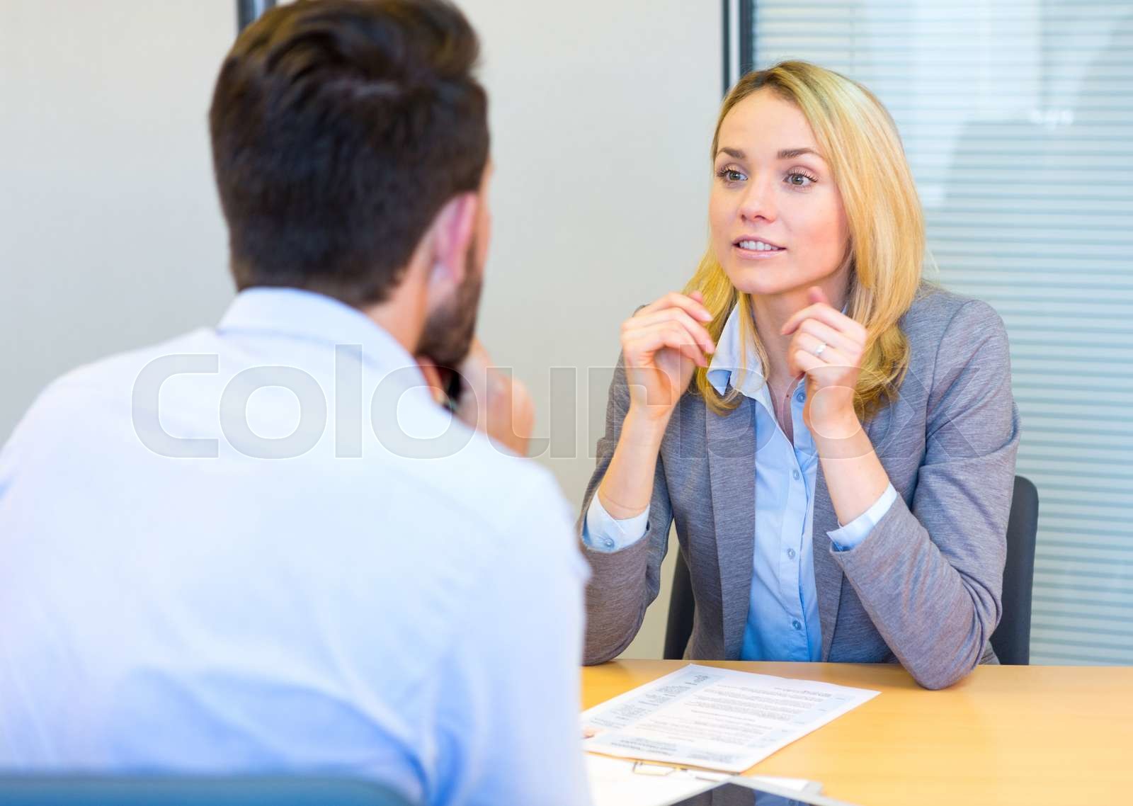 Young attractive woman during job interview | Stock image | Colourbox