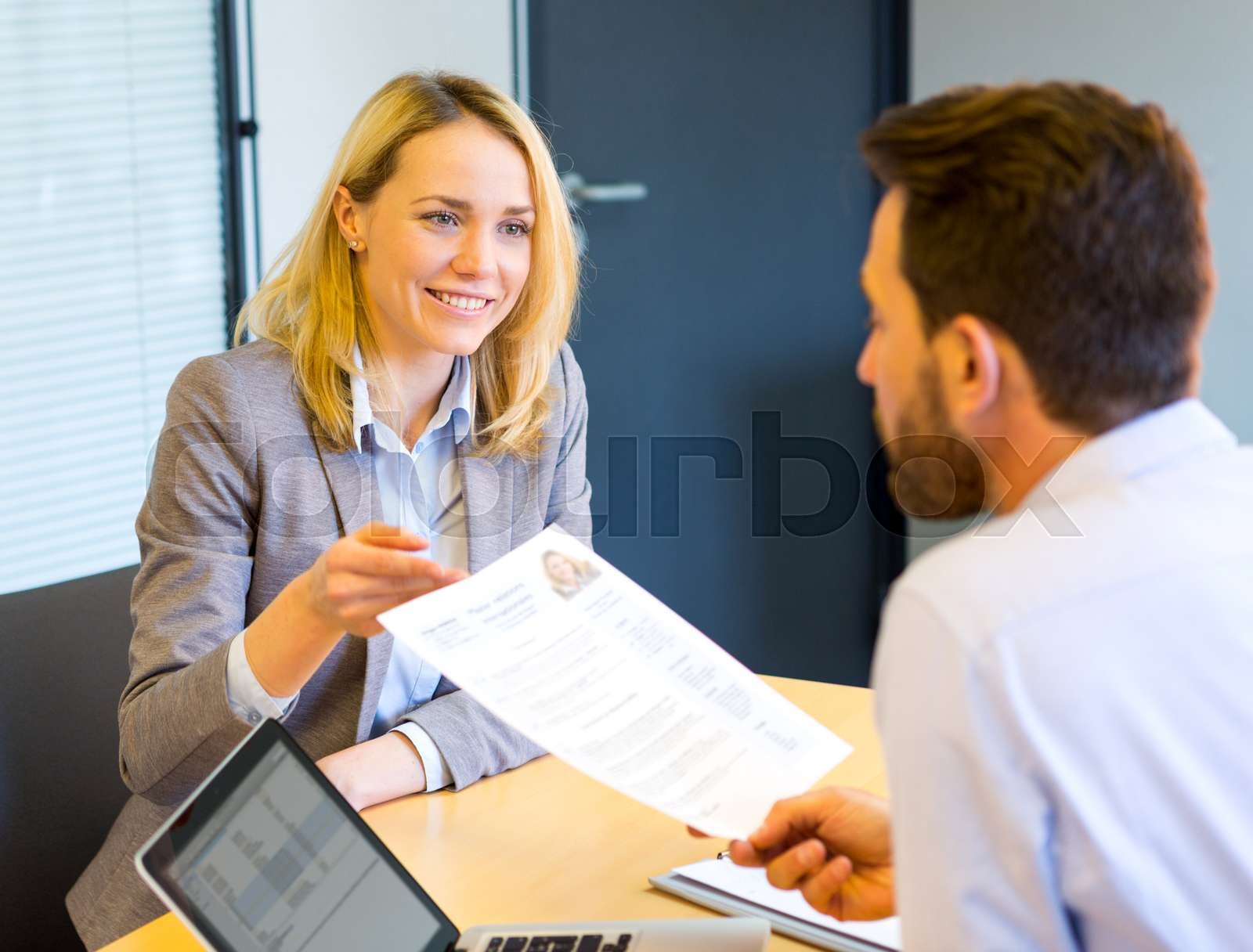 Young attractive woman during job interview | Stock image | Colourbox