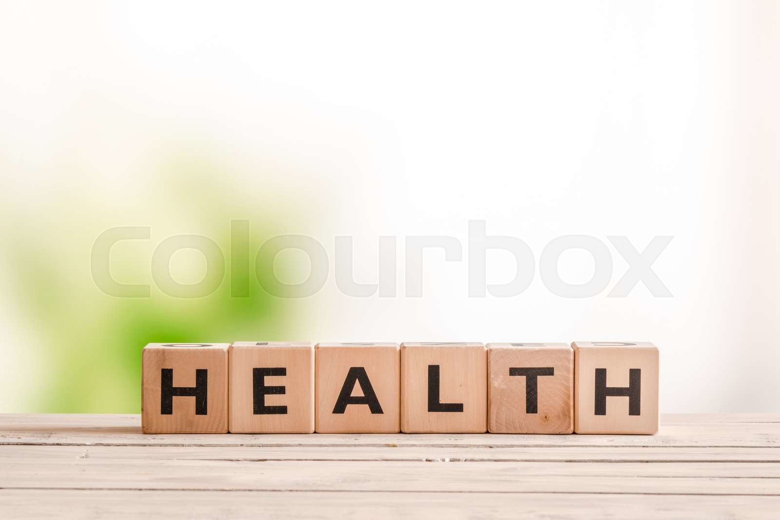 Health sign on a natural desk | Stock image | Colourbox