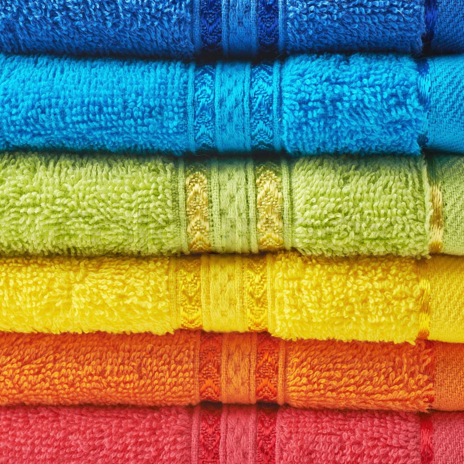 Pile of rainbow colored towels | Stock image | Colourbox
