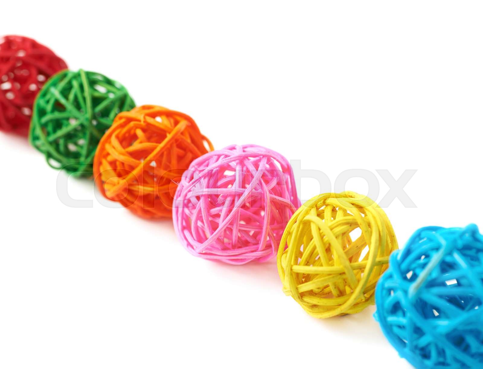 Line of straw balls isolated | Stock image | Colourbox