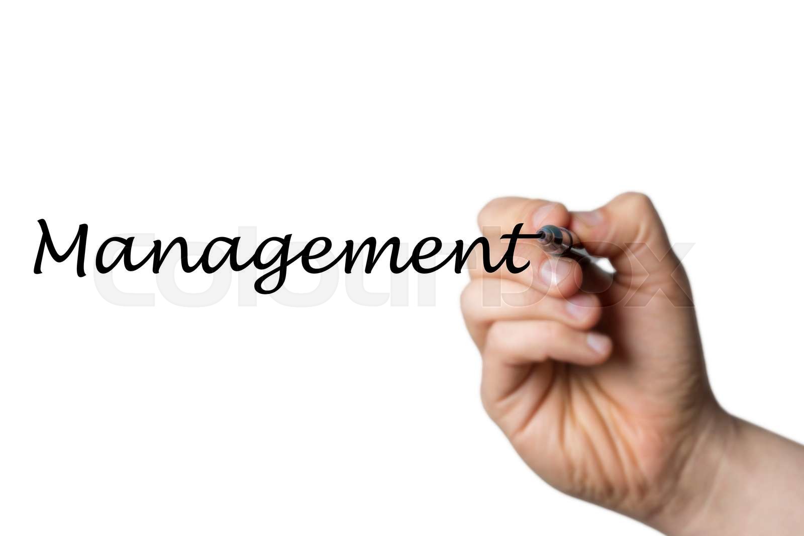 Management written by a hand | Stock image | Colourbox