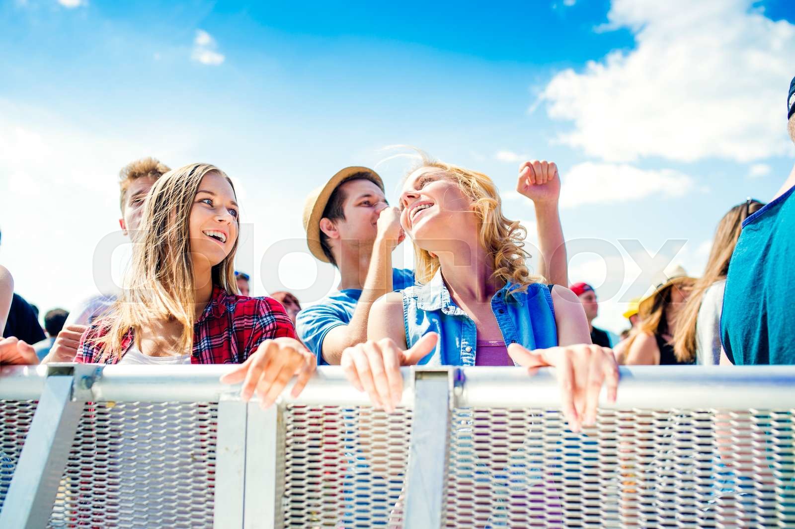 Teenagers at summer music festival dancing and singing | Stock image ...