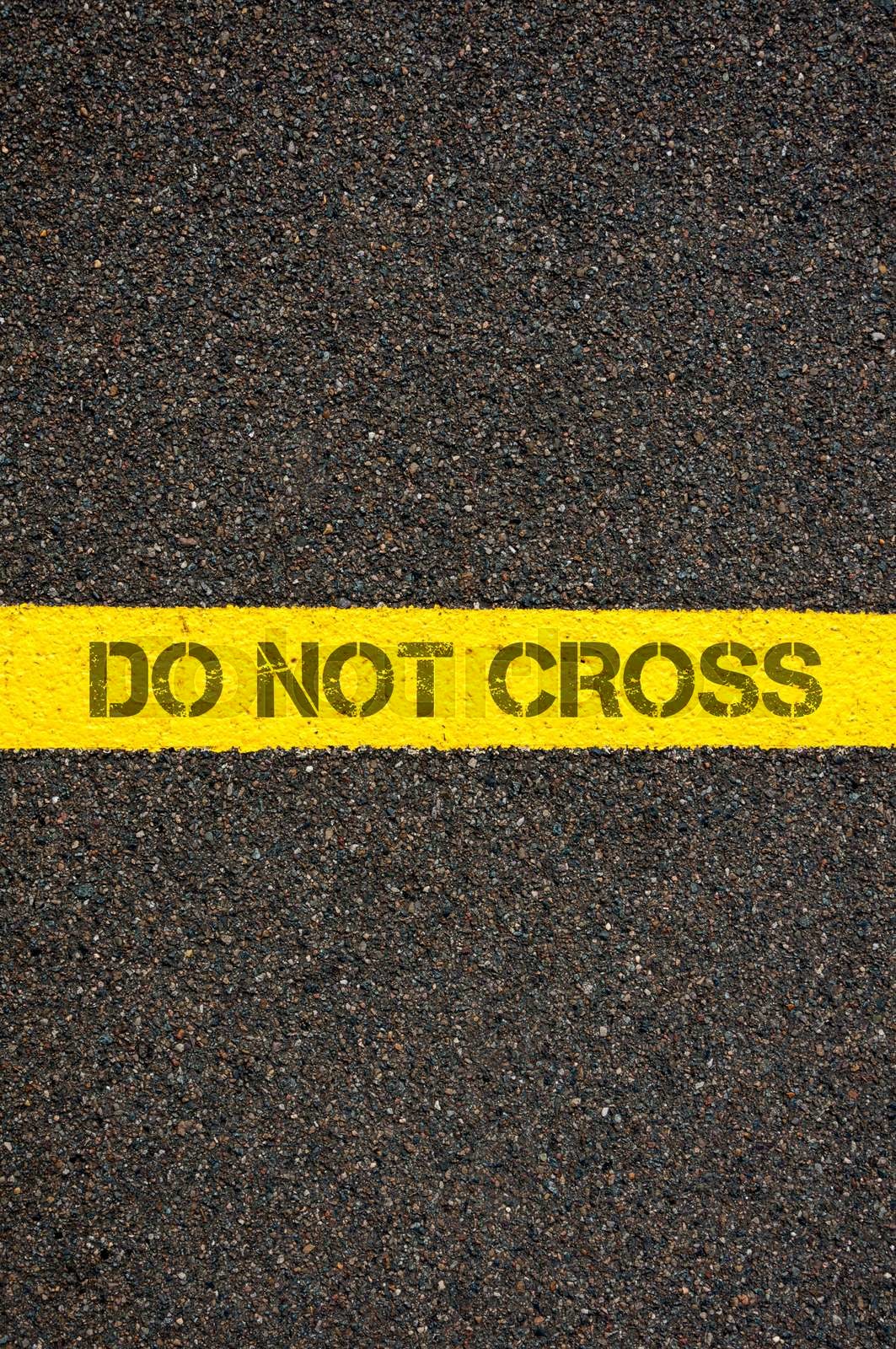 Road marking yellow line with words DO NOT CROSS | Stock image | Colourbox