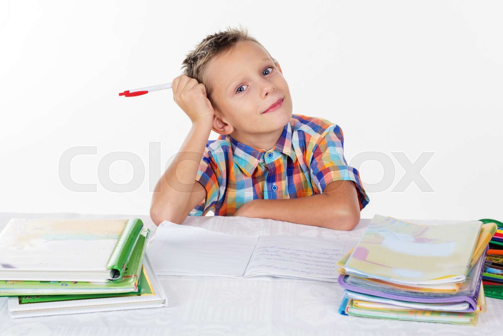 Smart school boy is thinking | Stock image | Colourbox