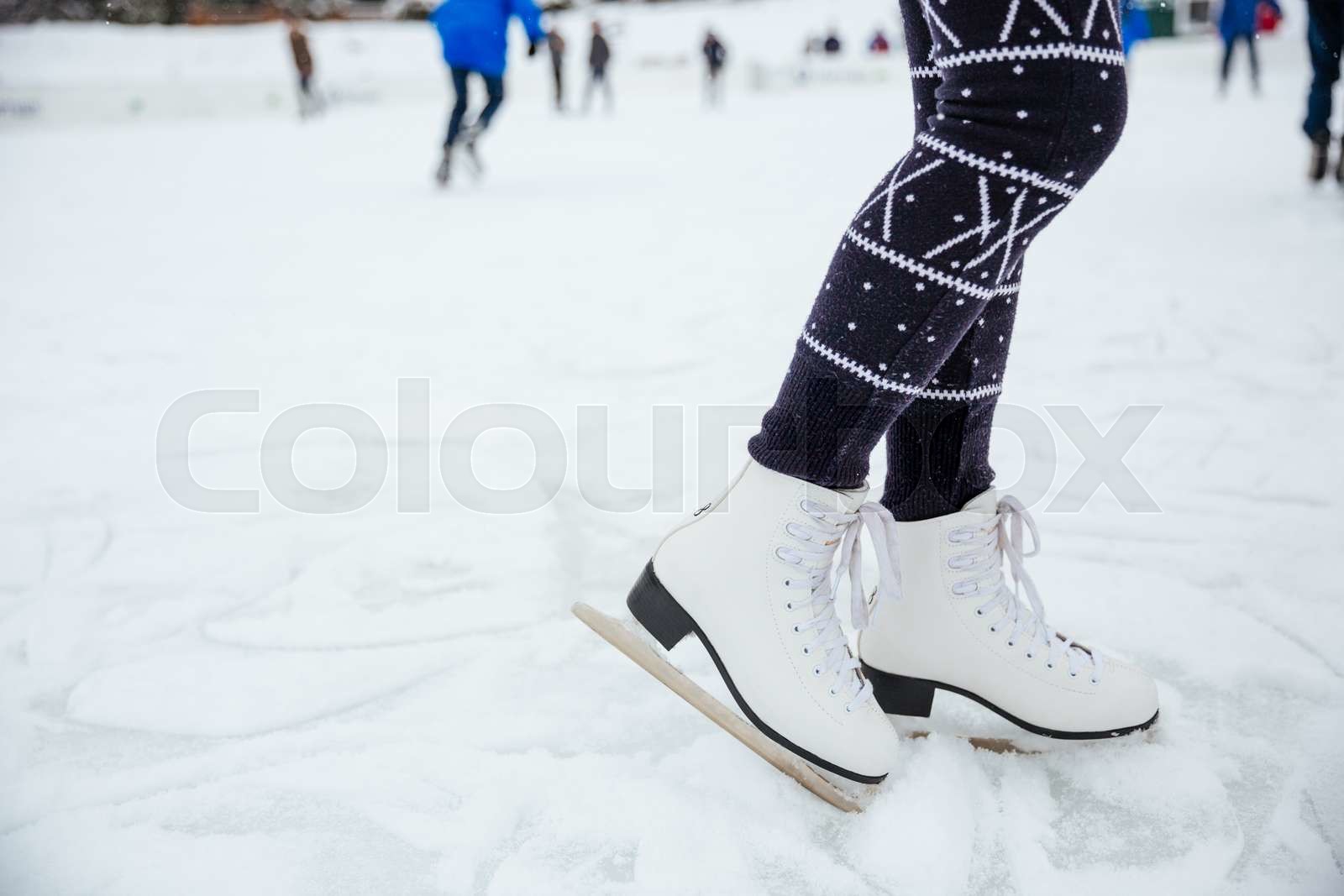 Female legs in ice skates | Stock image | Colourbox