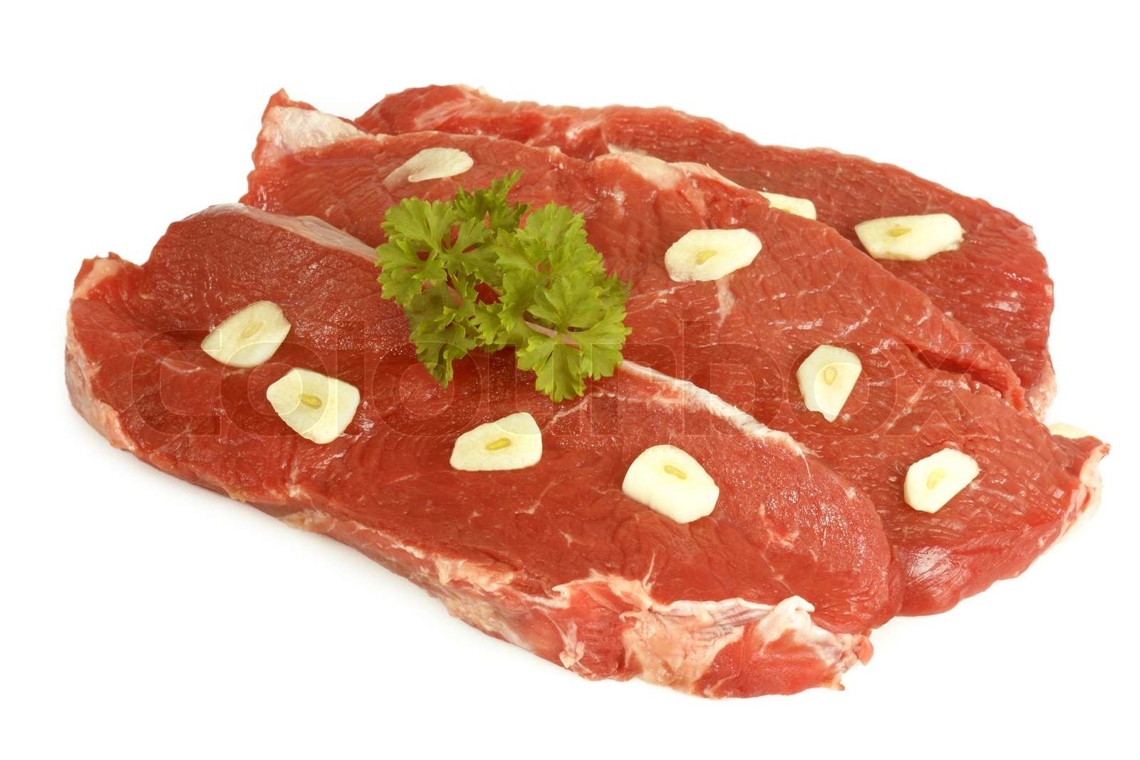 A prime cut of a raw ribeye beef steak. | Stock image | Colourbox