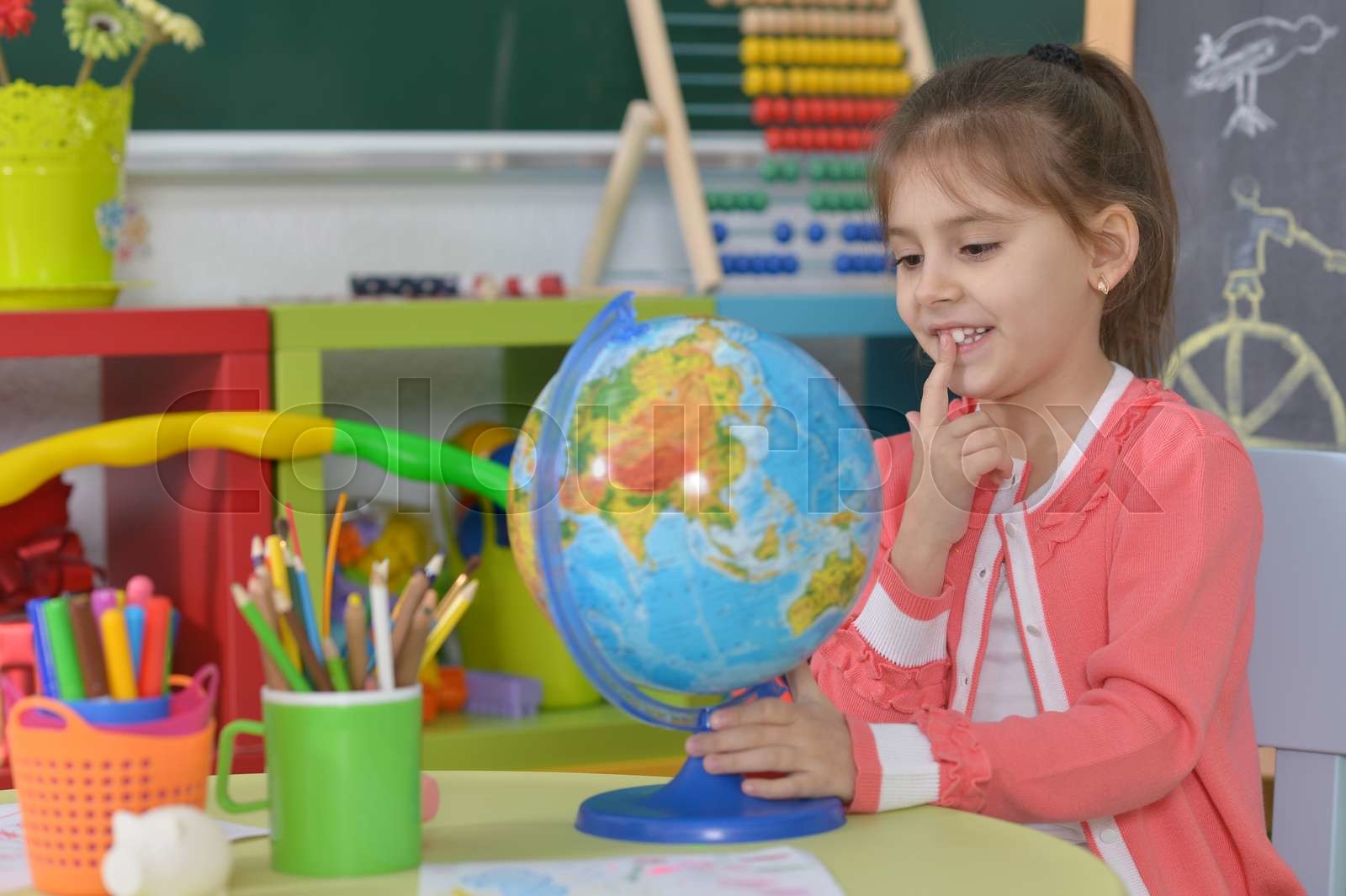 Beautiful little girl at classroom | Stock image | Colourbox