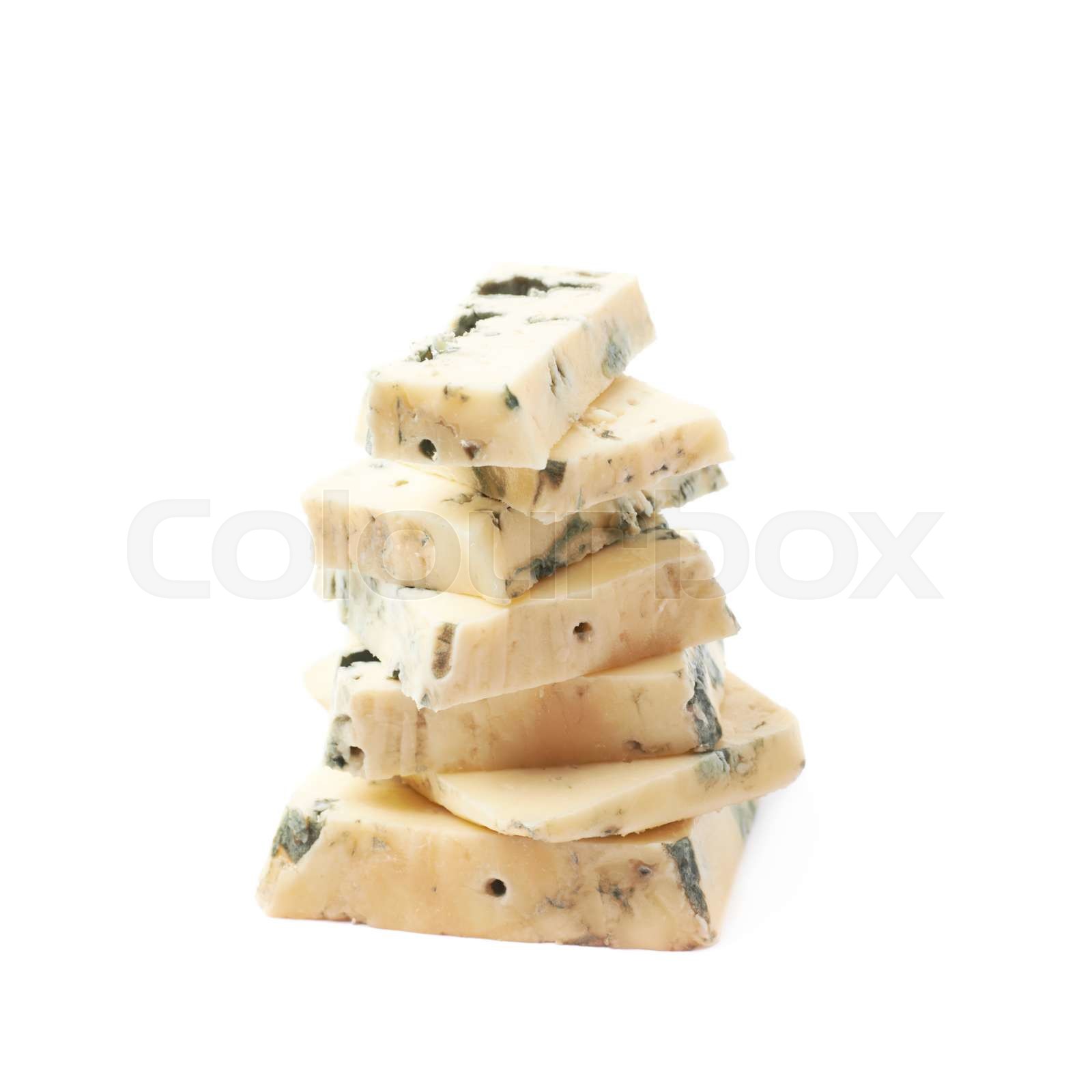 Pile of blue cheese slices isolated | Stock image | Colourbox