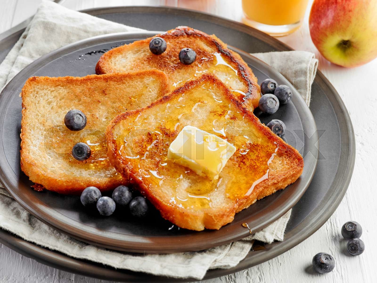 French toast with butter and honey | Stock image | Colourbox