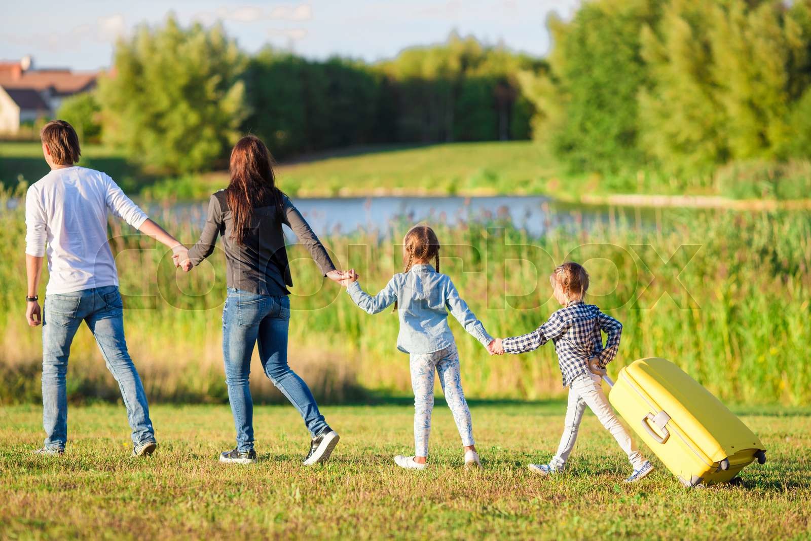 Family with baggage on vacation | Stock image | Colourbox