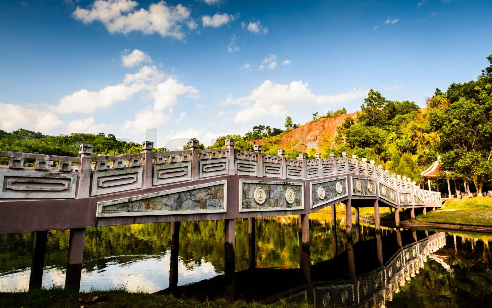 Chinese style bridge on the river | Stock image | Colourbox