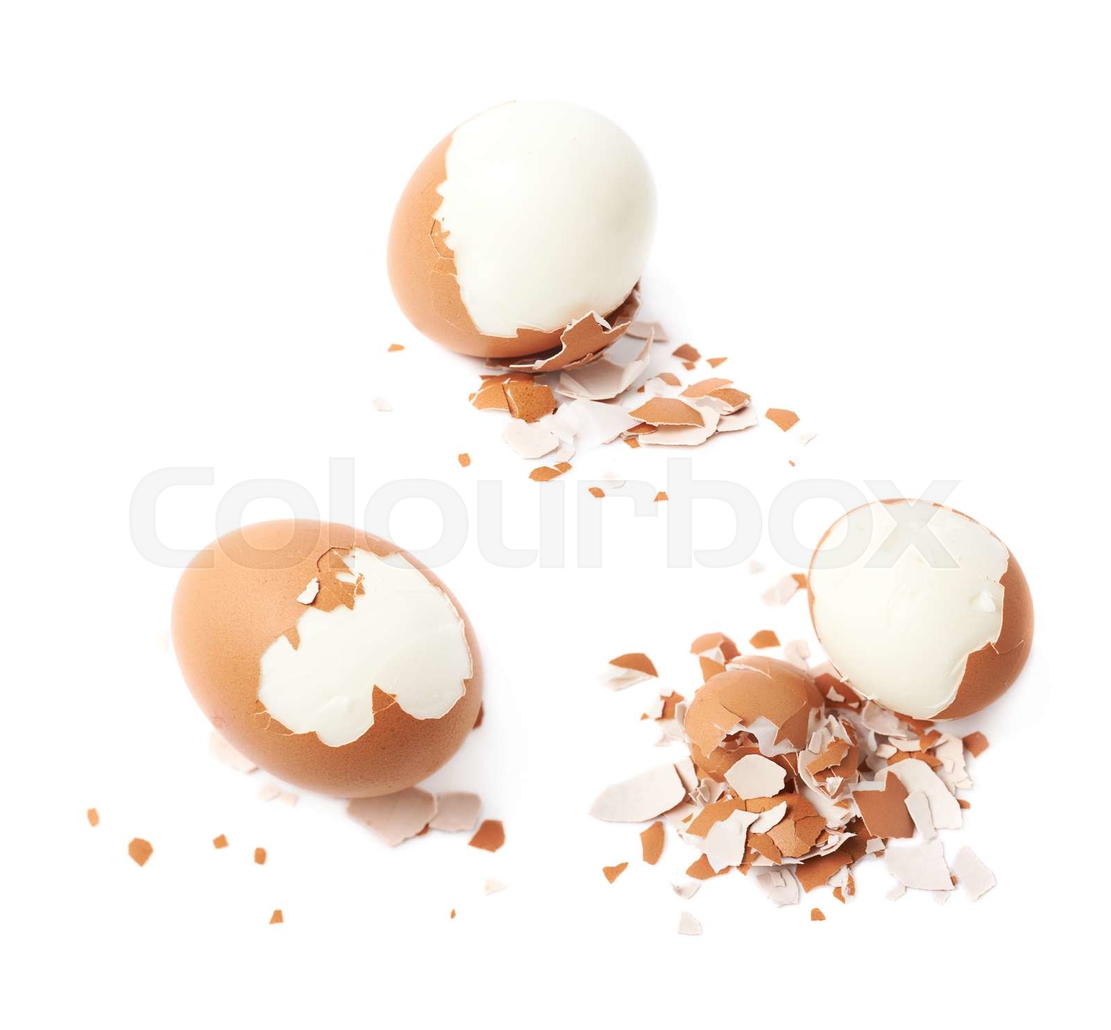Cracked hard boiled egg isolated | Stock image | Colourbox