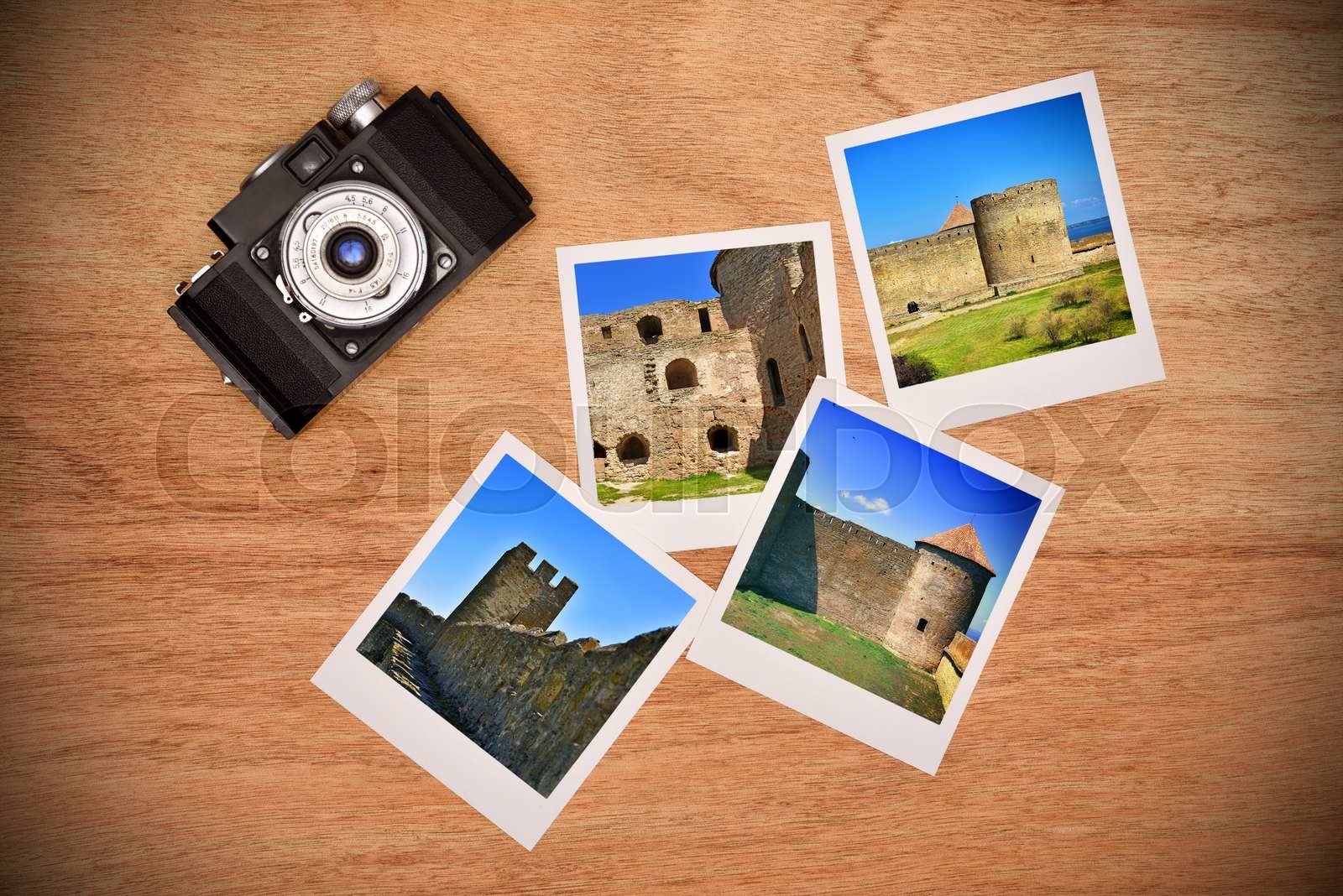 camera and photos with medieval castle | Stock image | Colourbox