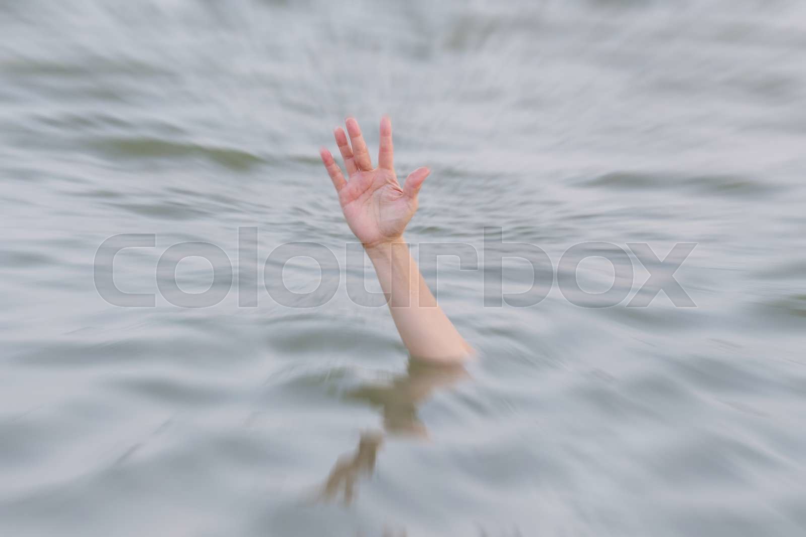 hand drowning in the sea | Stock image | Colourbox