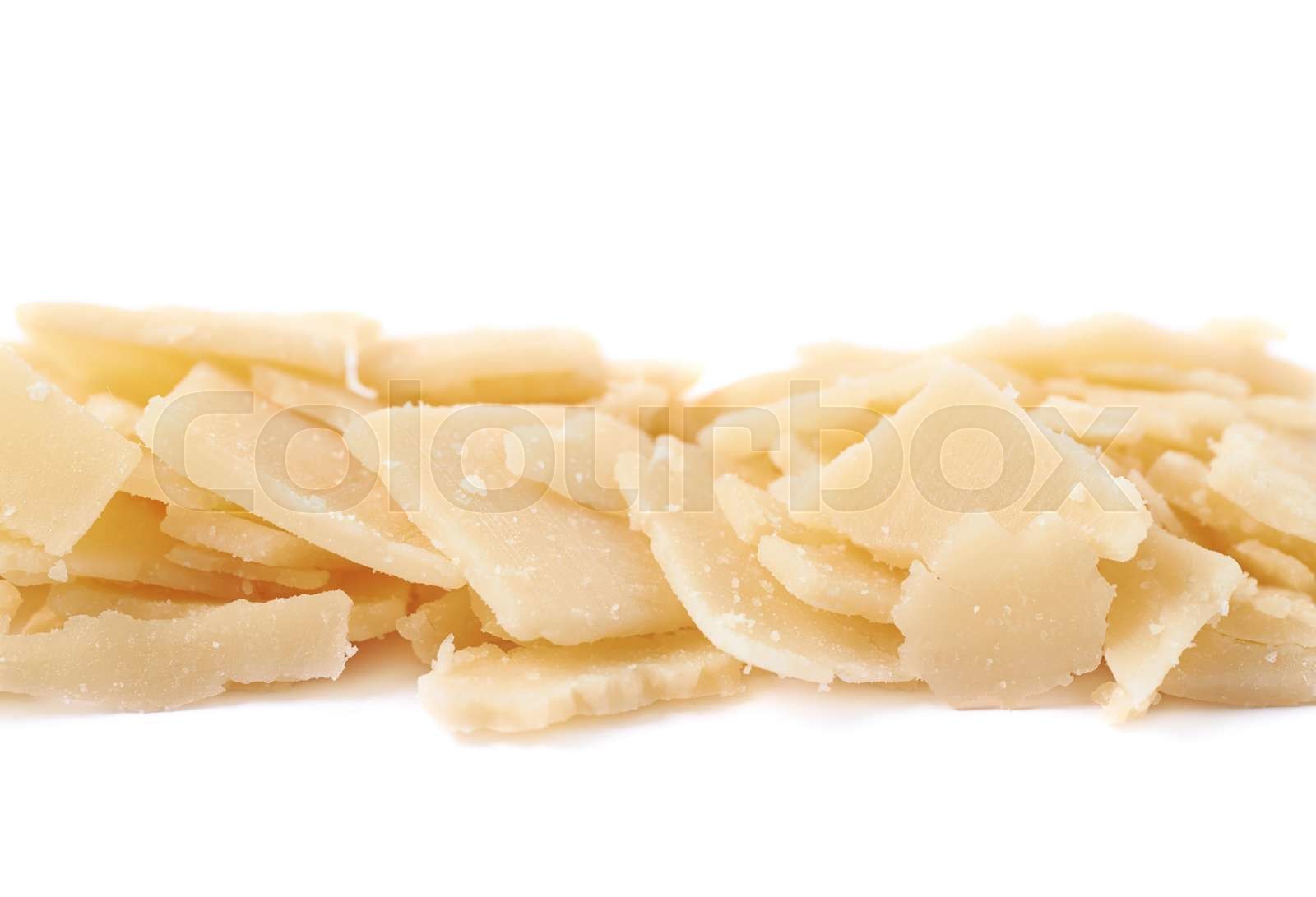 Line of parmesan cheese flakes | Stock image | Colourbox