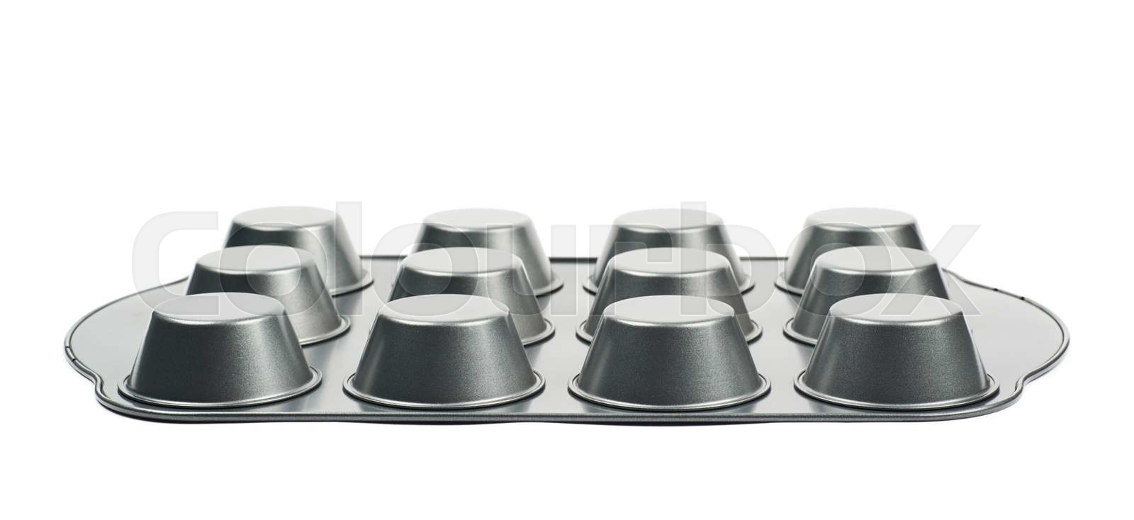 Metal muffin pan isolated | Stock image | Colourbox