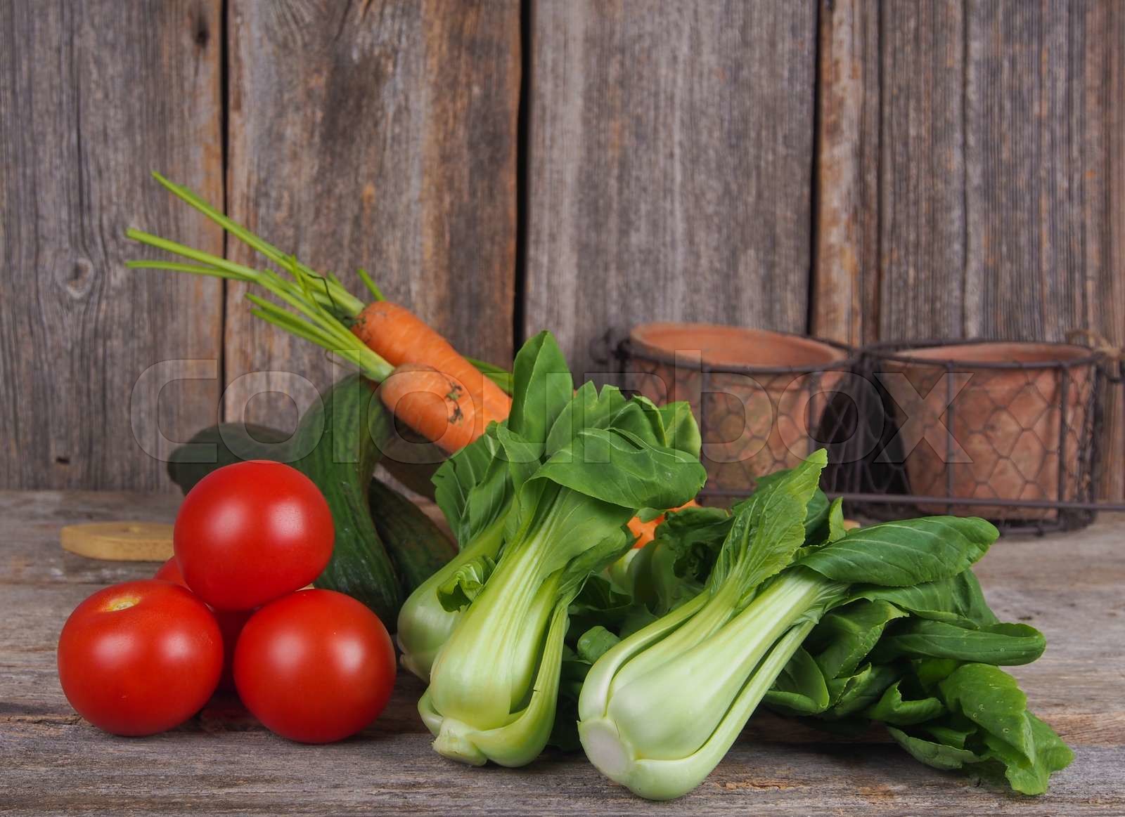 Carrots, chinese spinach cabbage and tomatoes | Stock image | Colourbox