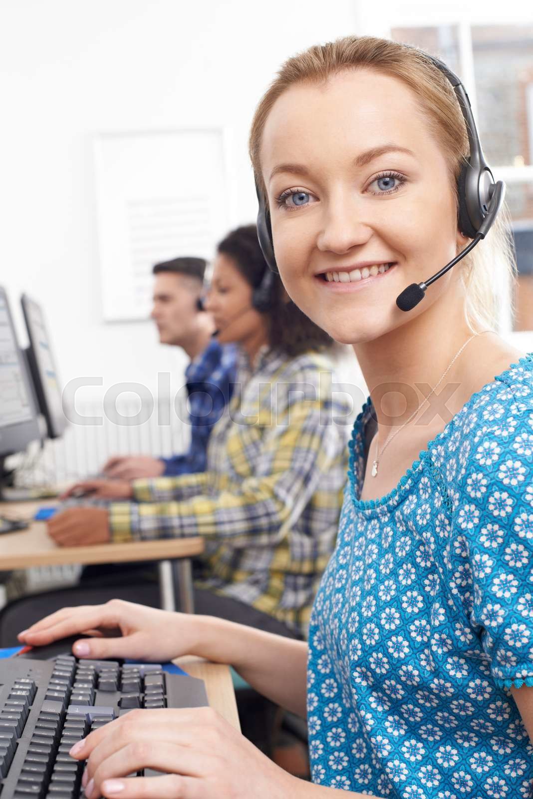 Female Customer Services Agent In Call Centre | Stock image | Colourbox