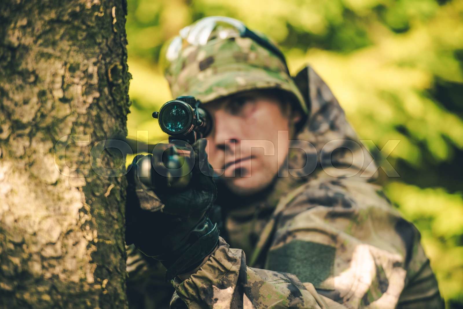 Wildlife Hunter with Rifle | Stock image | Colourbox