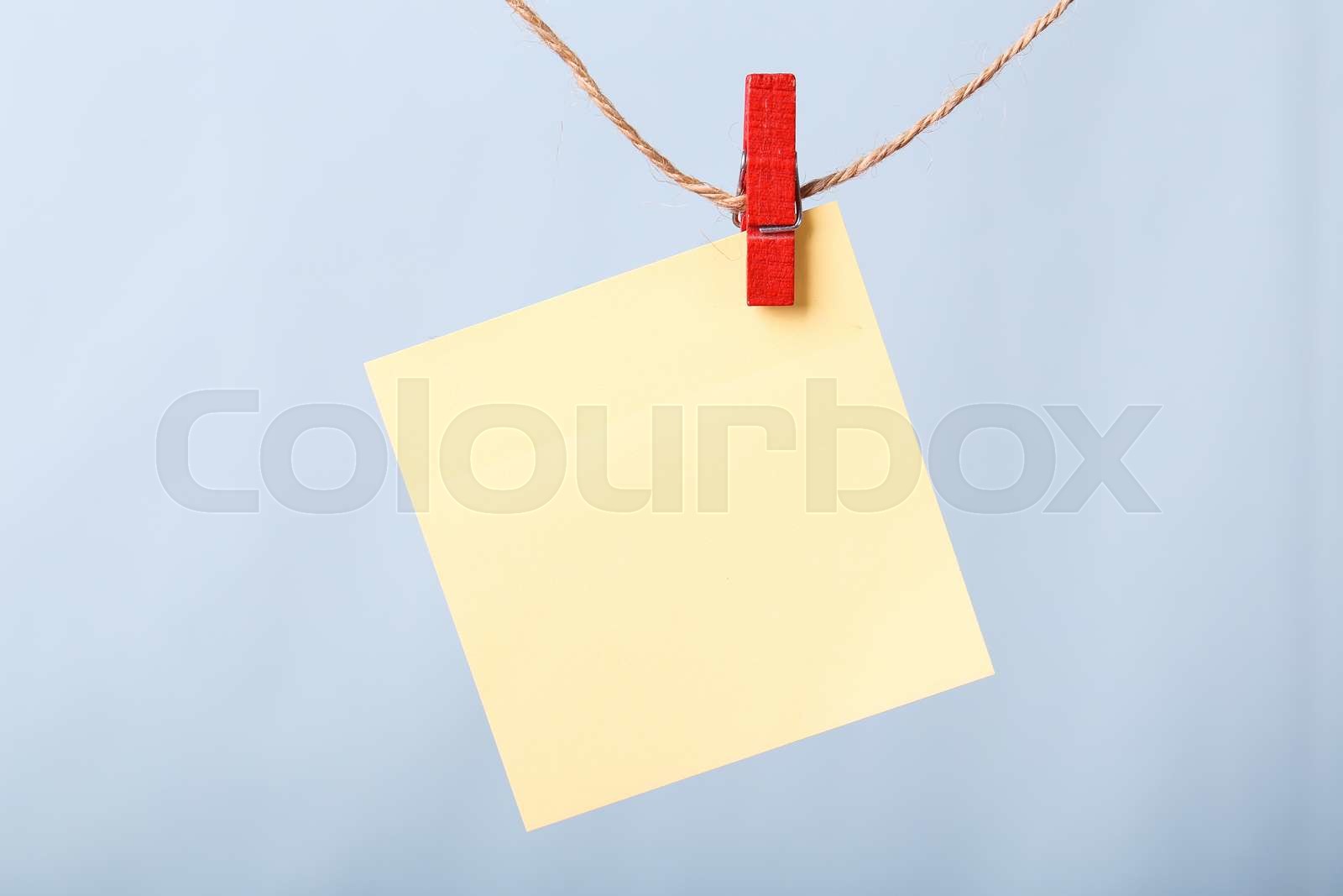 Blank Sticky Note Hanging On Line | Stock image | Colourbox