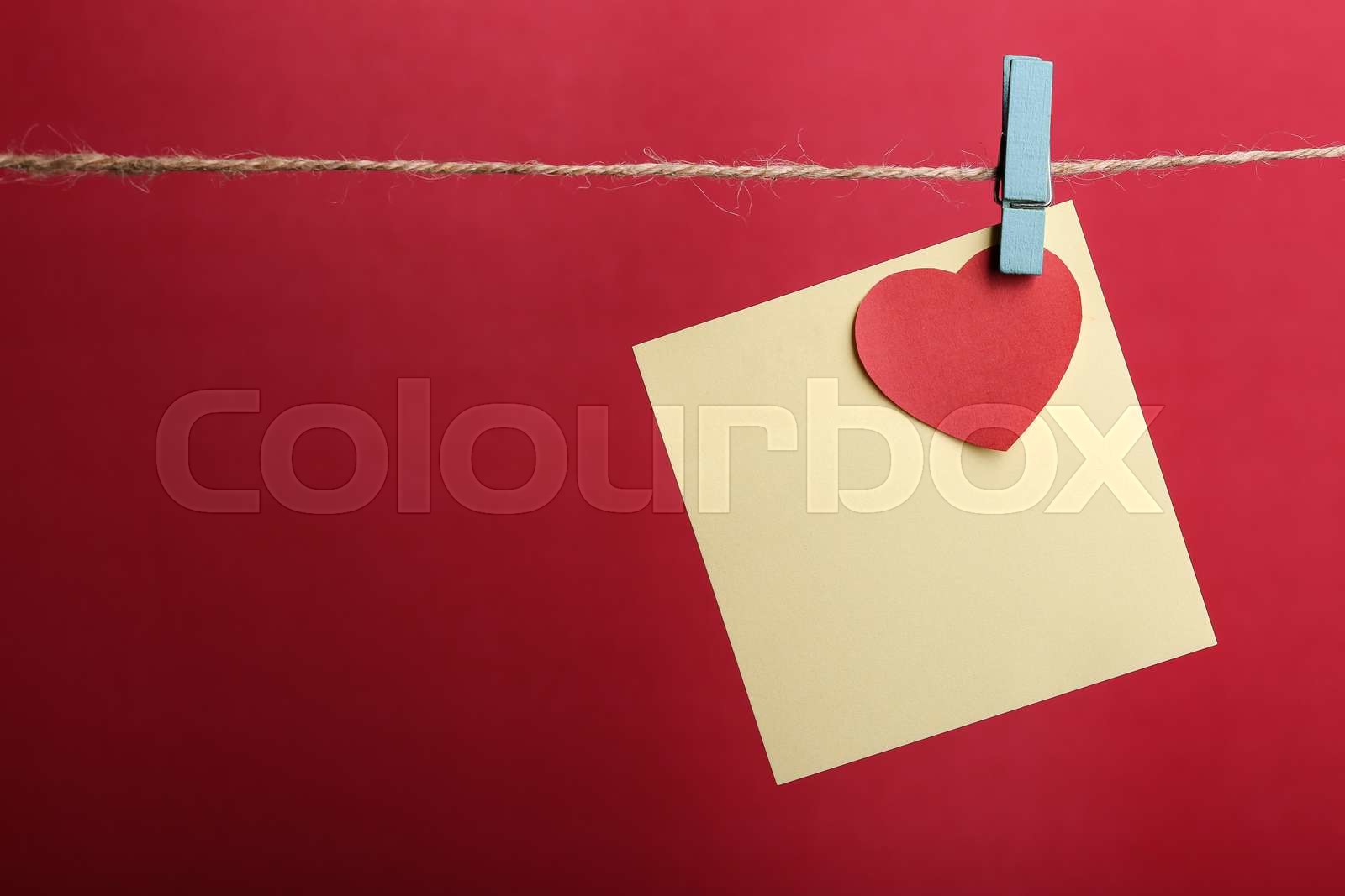 Blank Note With Red Heart Against Red Background | Stock image | Colourbox