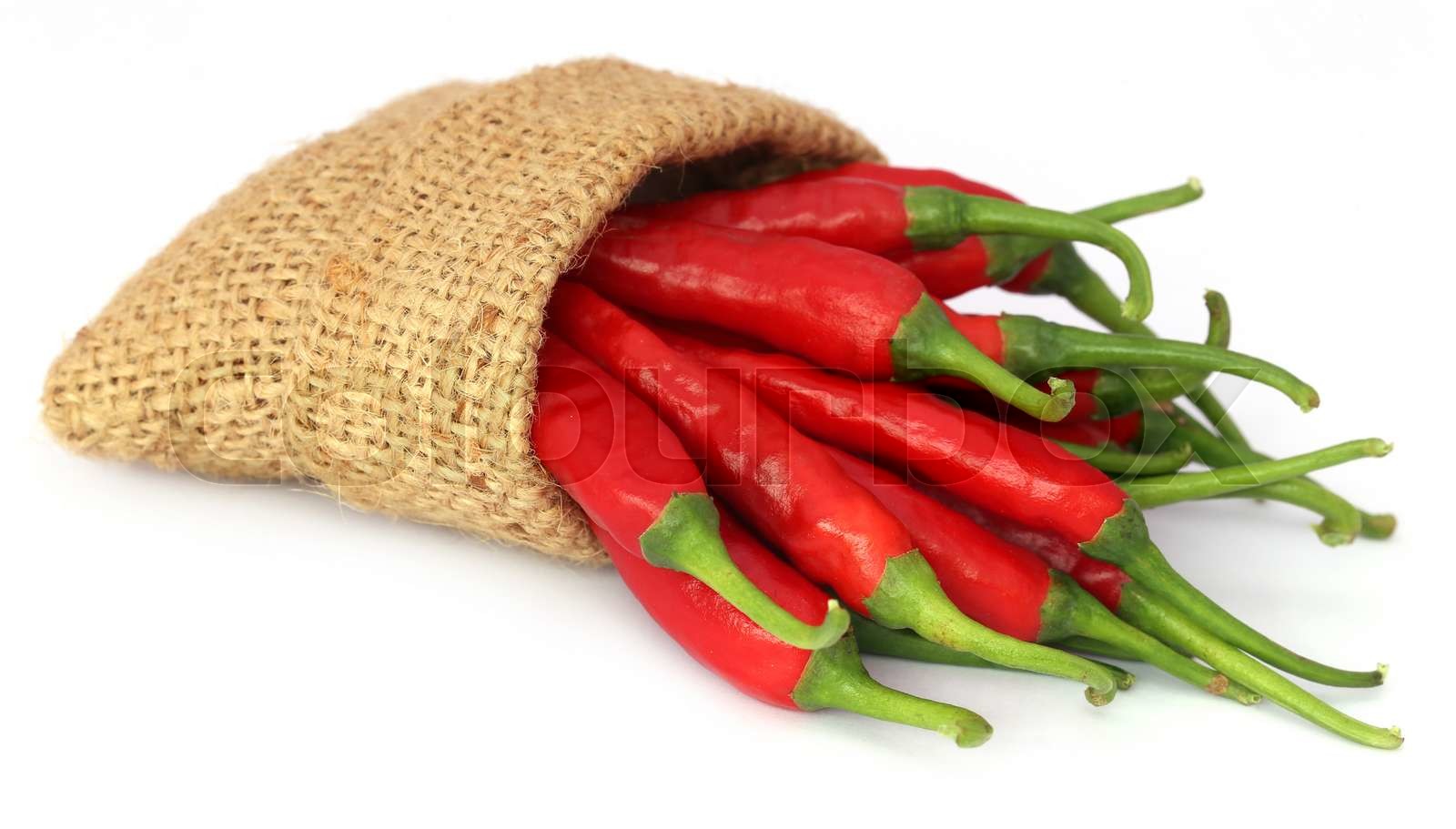 Red chili peppers in a sack bag | Stock image | Colourbox
