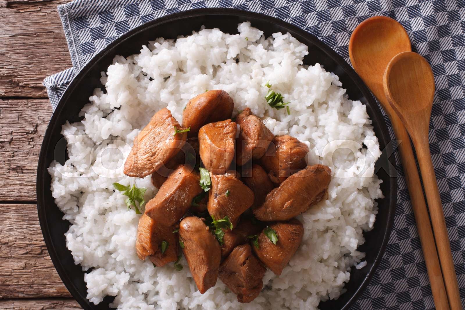 Philippine cuisine: Adobo with rice close-up. Horizontal top view ...