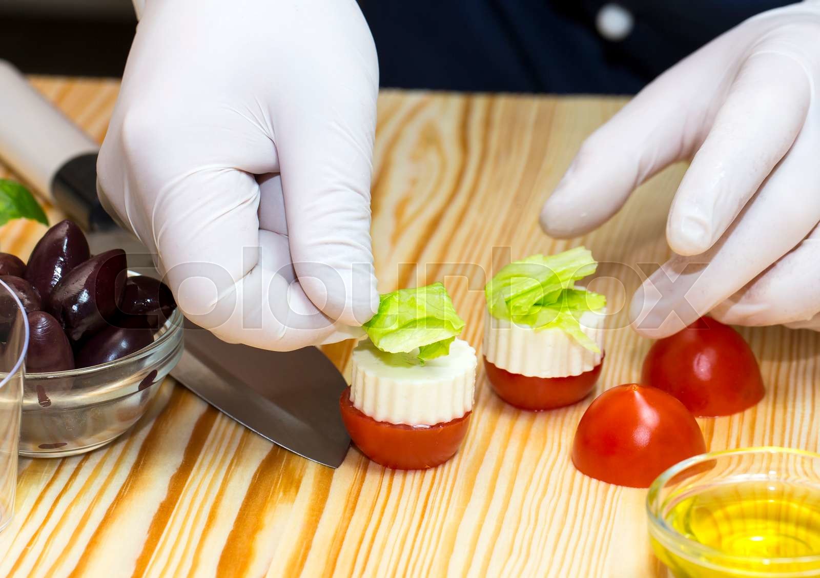 cook prepares canapes in the kitchen at the restaurant | Stock image ...