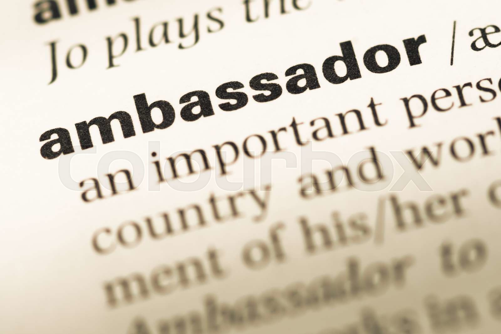 Close up of old English dictionary page with word ambassador. | Stock ...