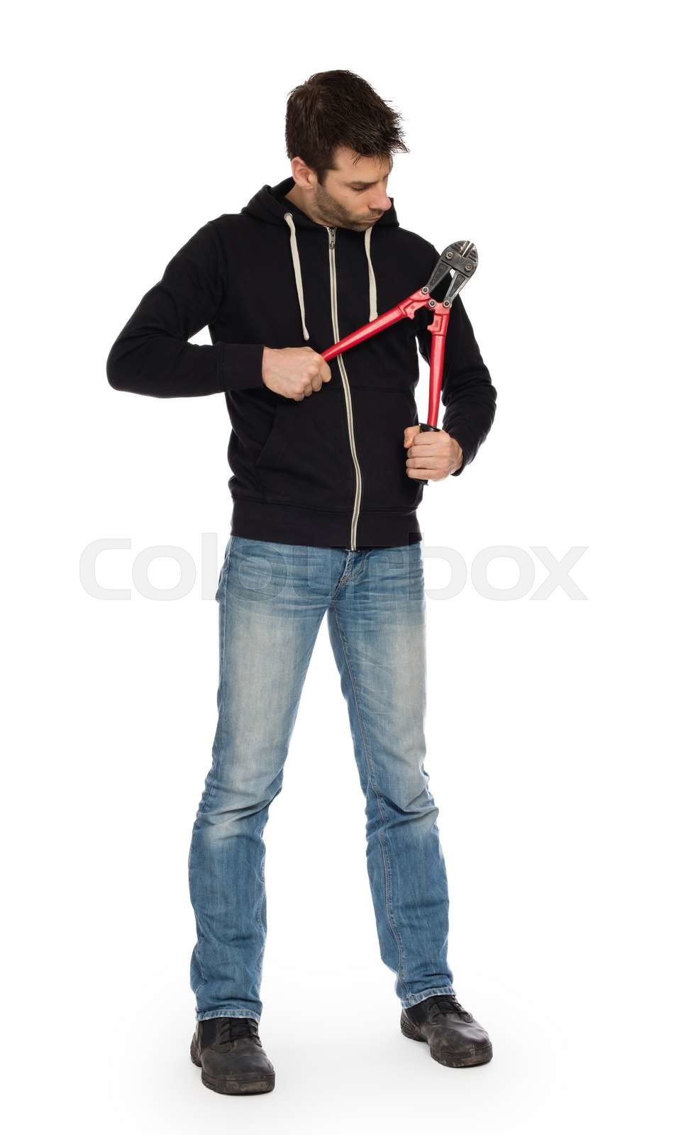 Robber with red bolt cutters | Stock image | Colourbox