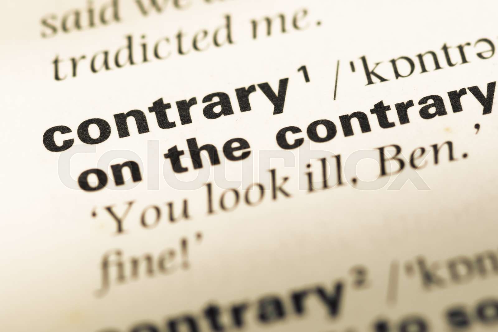 Close up of old English dictionary page with word contrary. | Stock ...