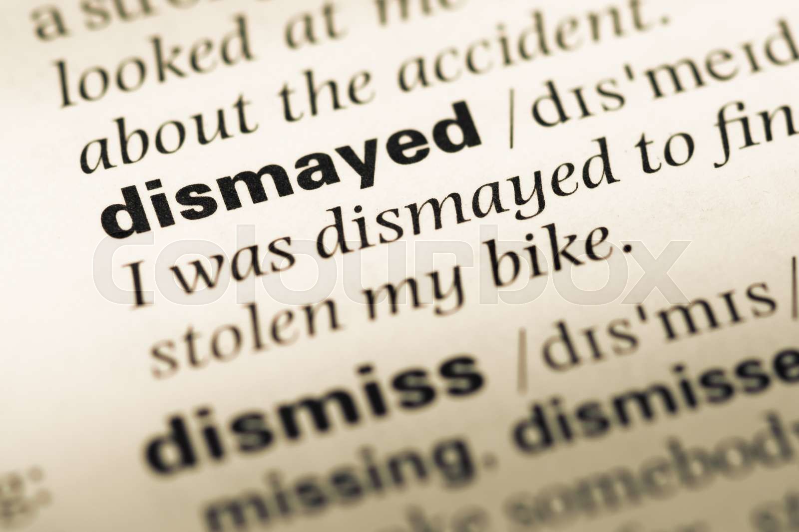 Close up of old English dictionary page with word dismayed. | Stock ...