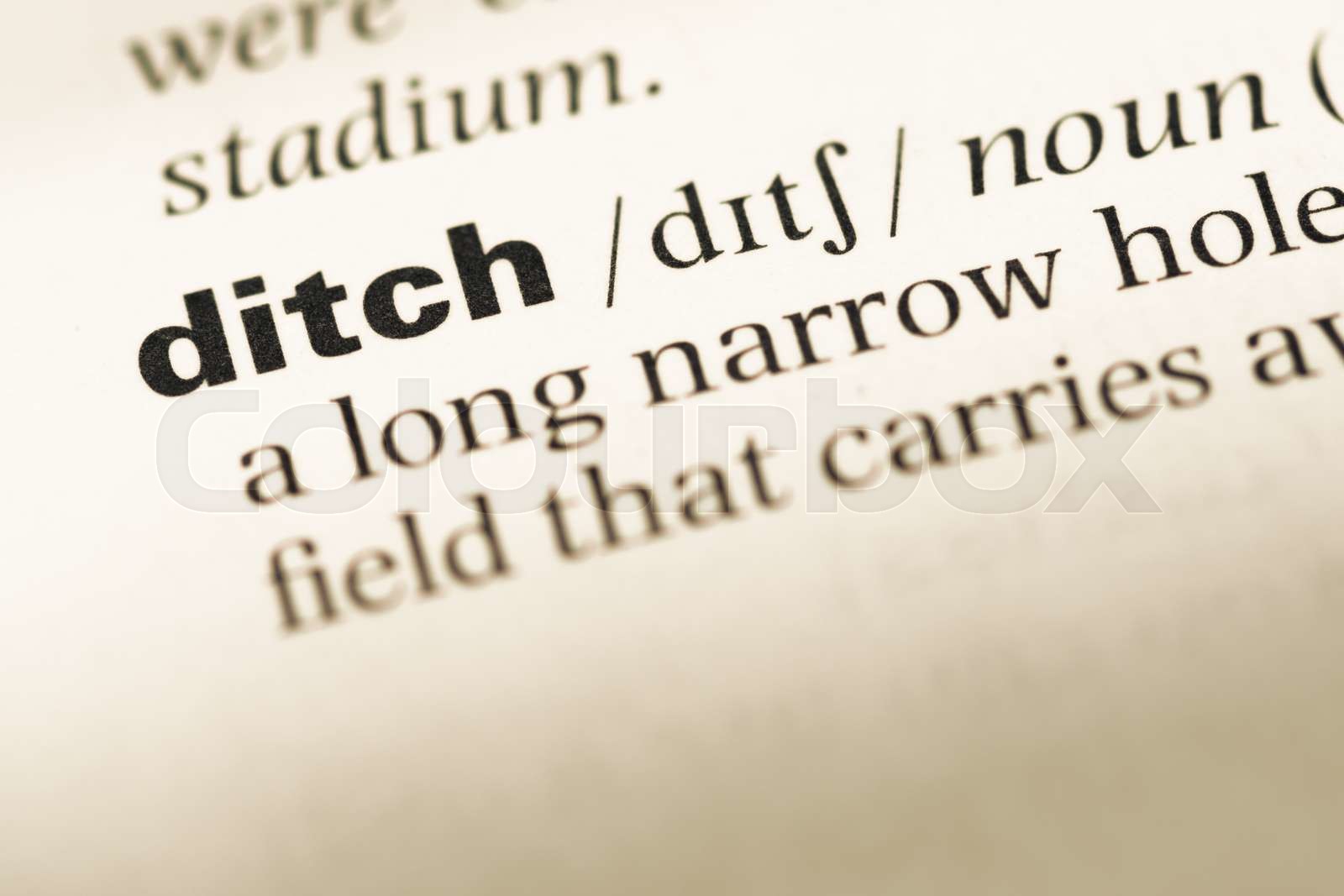 Close up of old English dictionary page with word ditch. | Stock image ...