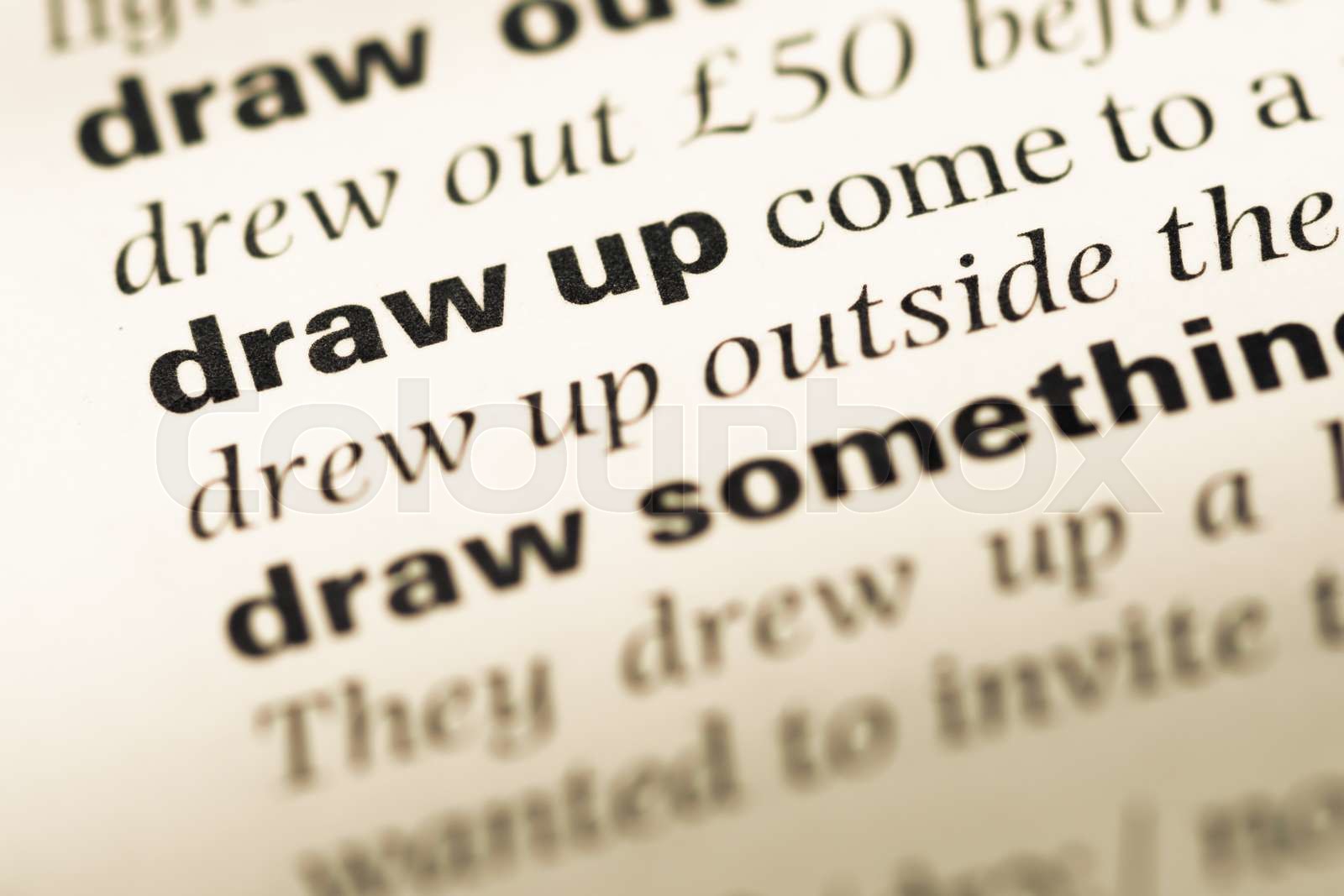 Close up of old English dictionary page with word draw up. | Stock ...