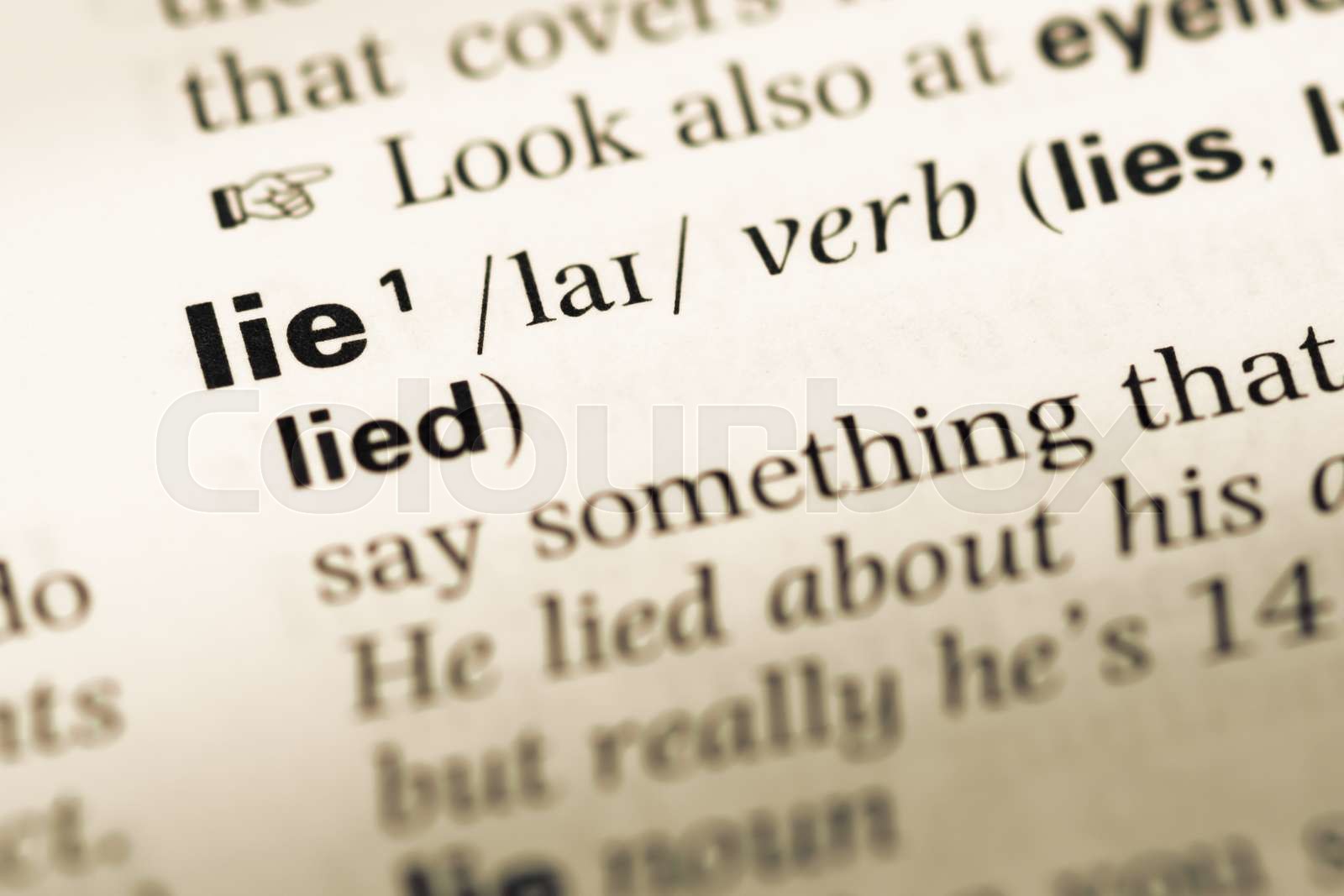 Close up of old English dictionary page with word lie. | Stock image ...