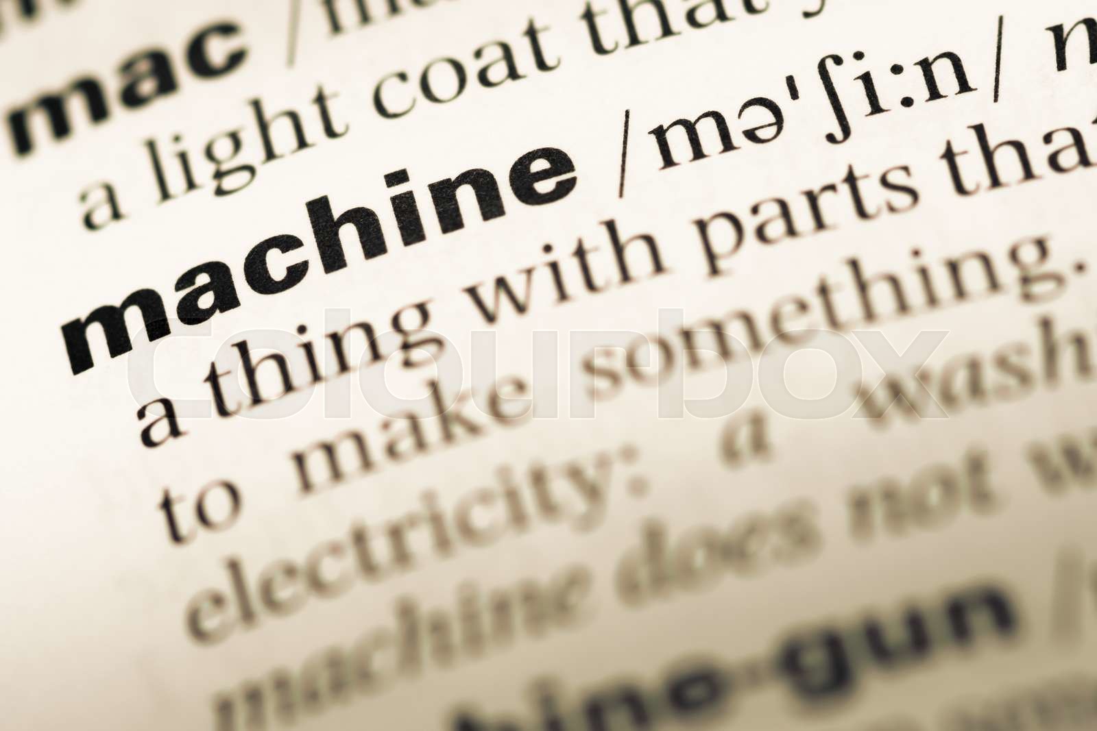 Close up of old English dictionary page with word machine. | Stock ...