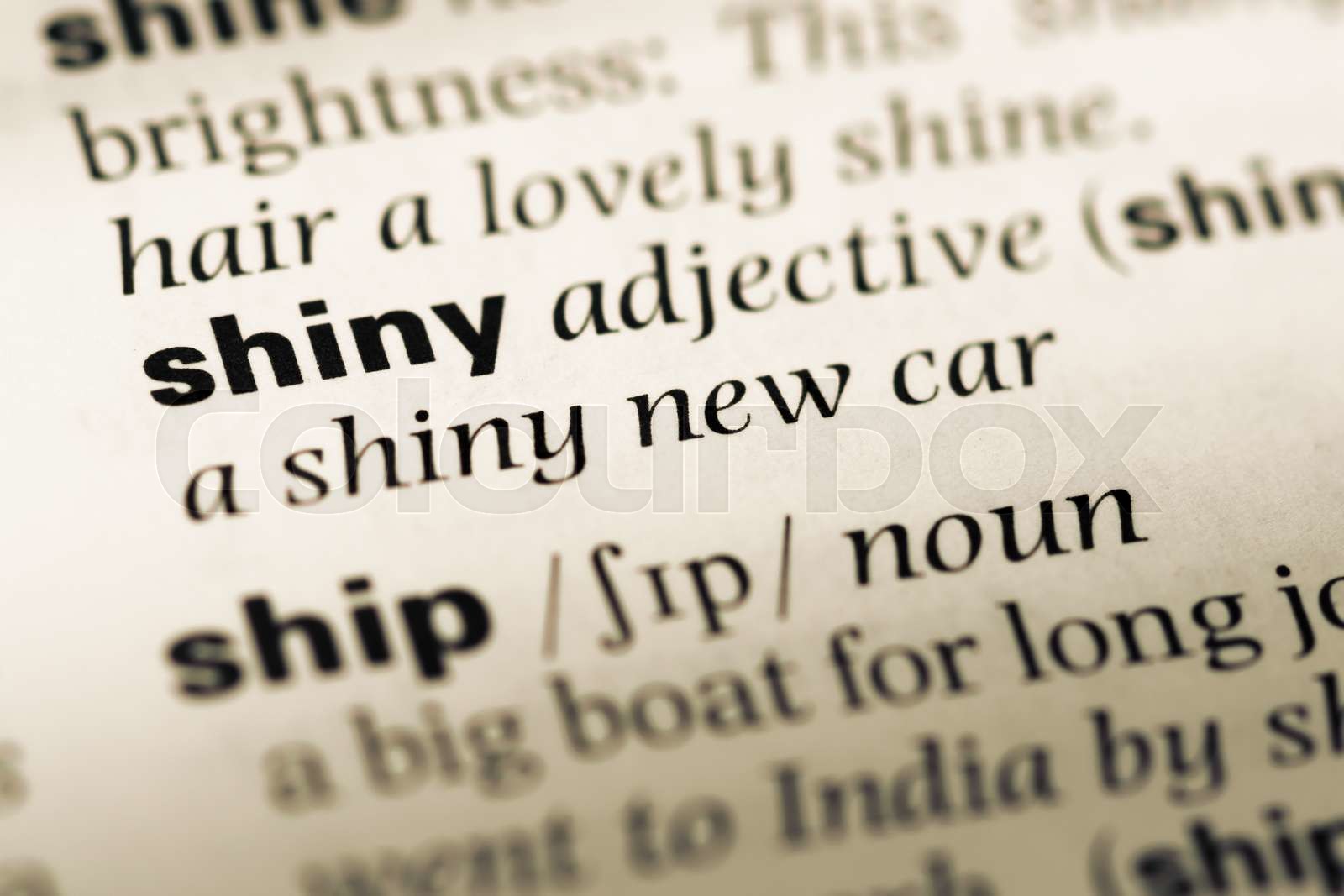 Close up of old English dictionary page with word shiny. | Stock image ...