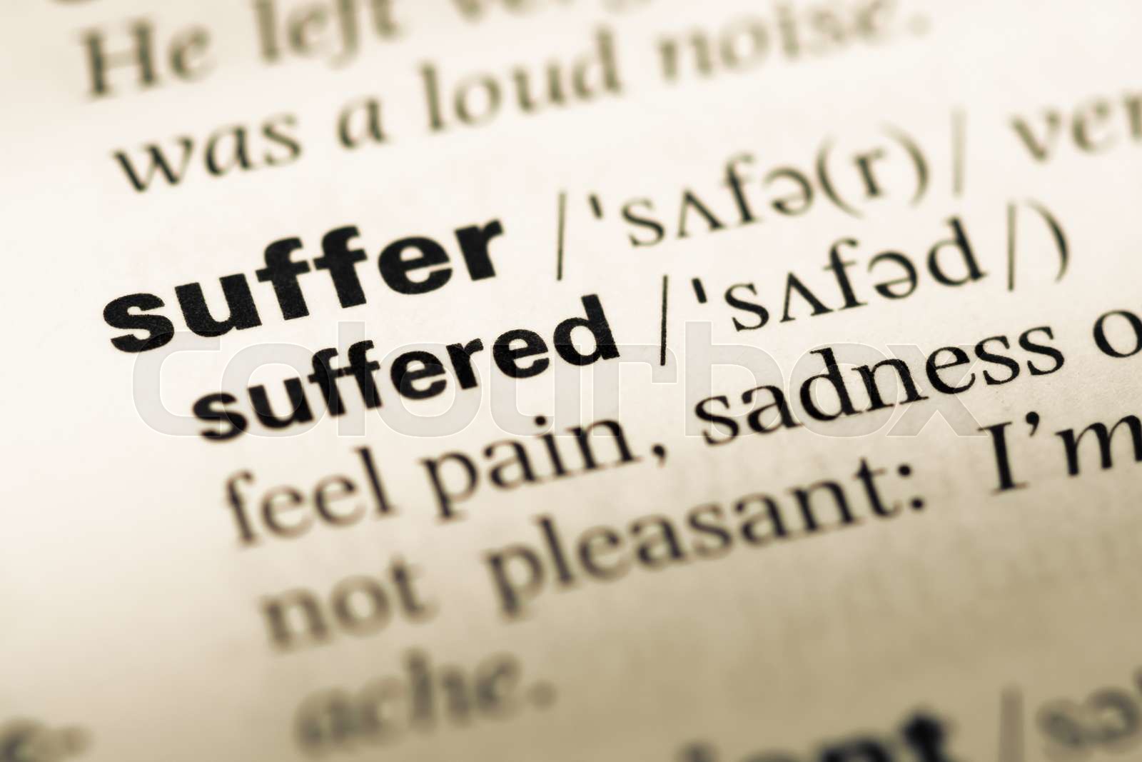 Close up of old English dictionary page with word suffer. | Stock image ...