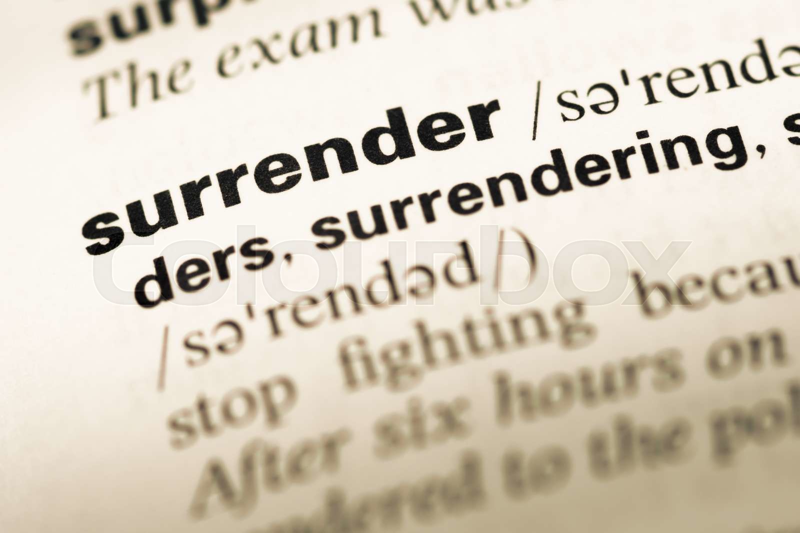 Close up of old English dictionary page with word surrender. | Stock ...