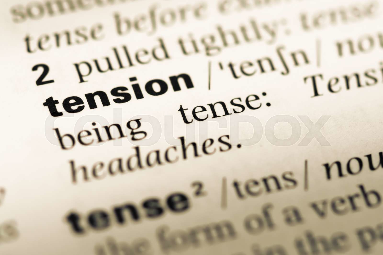 Close up of old English dictionary page with word tension. | Stock ...