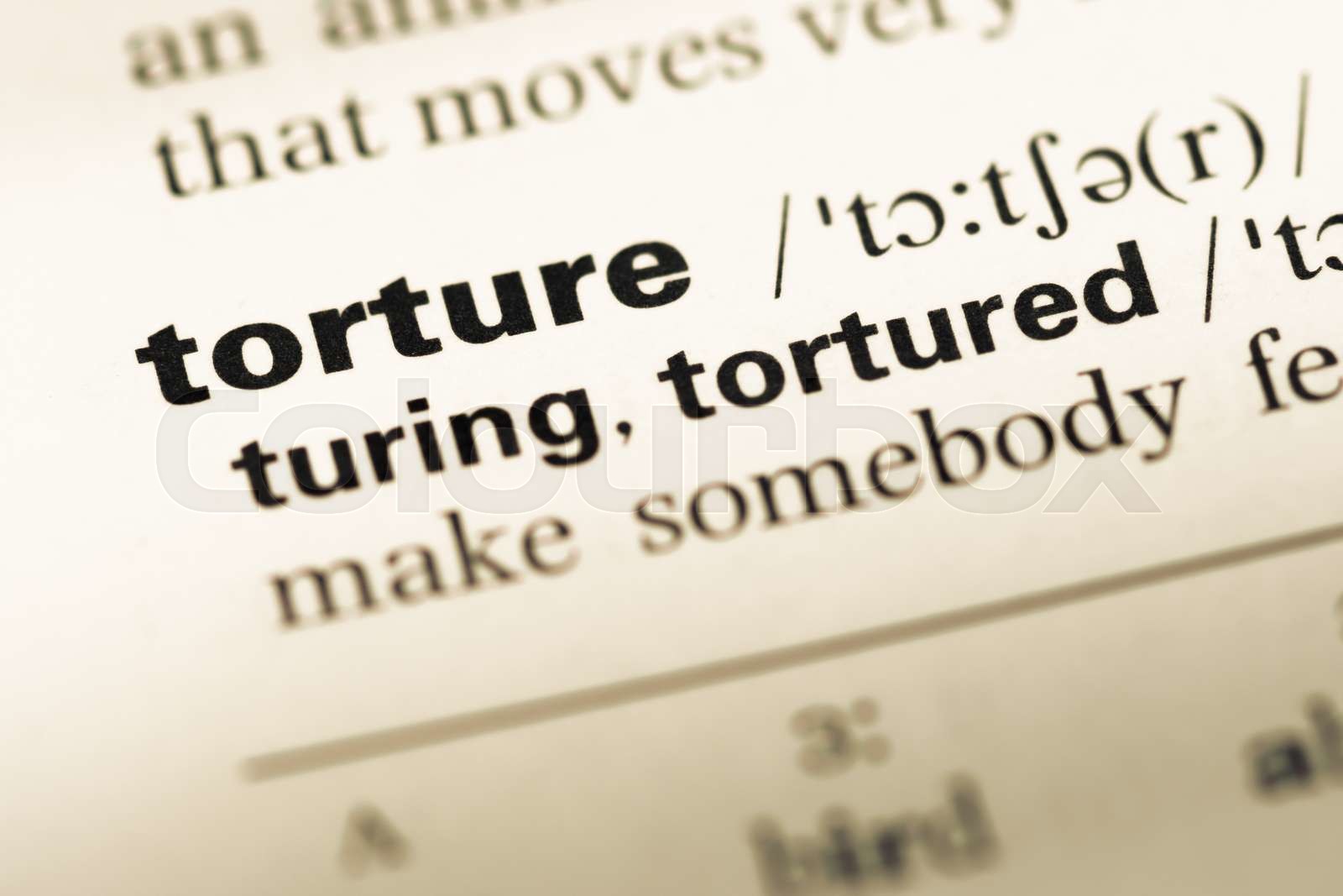 Close up of old English dictionary page with word torture. | Stock ...