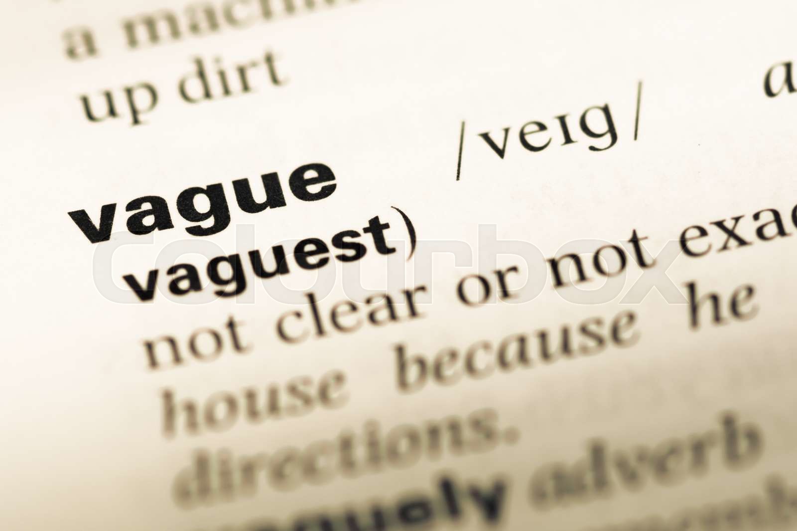 Close up of old English dictionary page with word vague. | Stock image ...