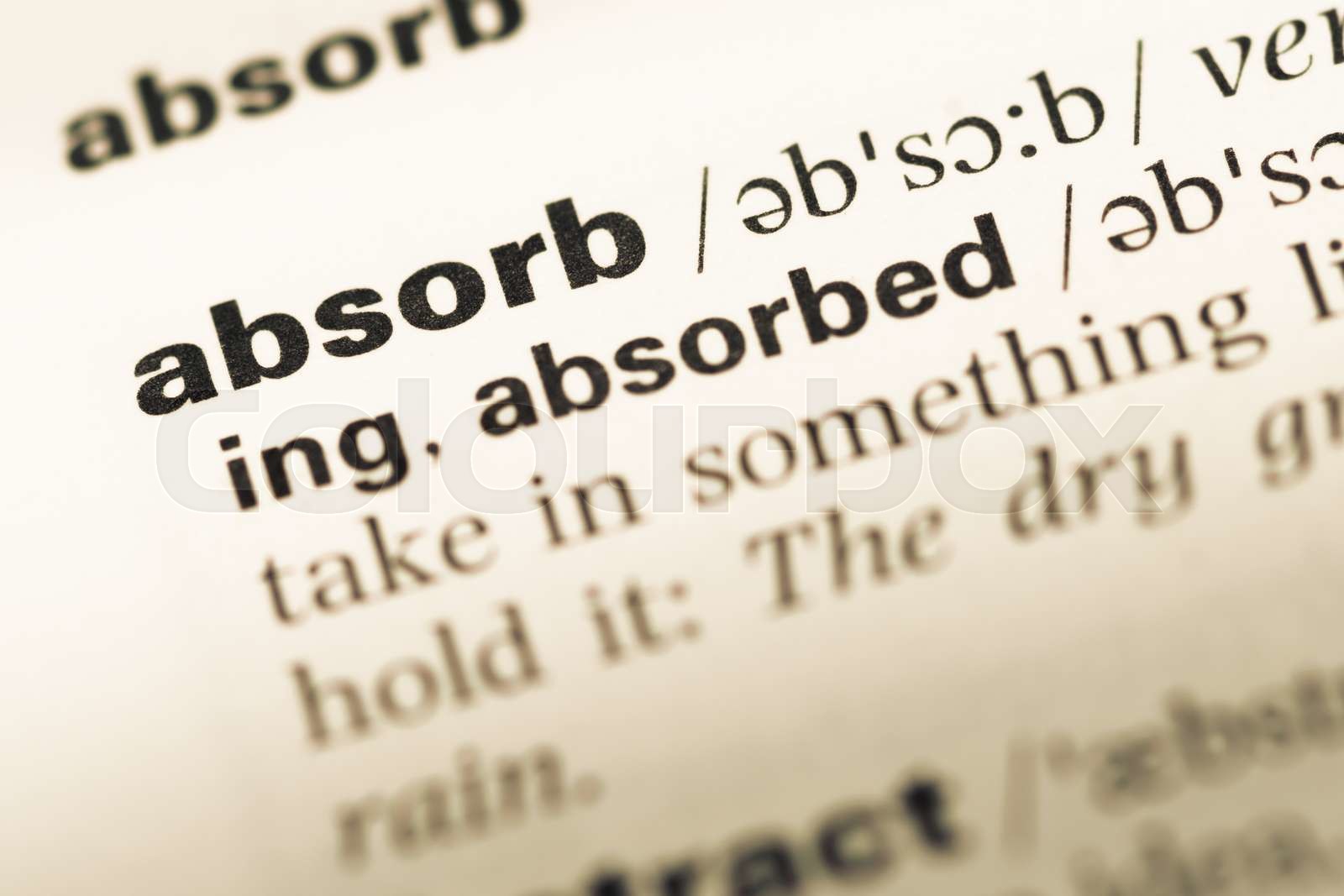 Close up of old English dictionary page with word absorb. | Stock image ...